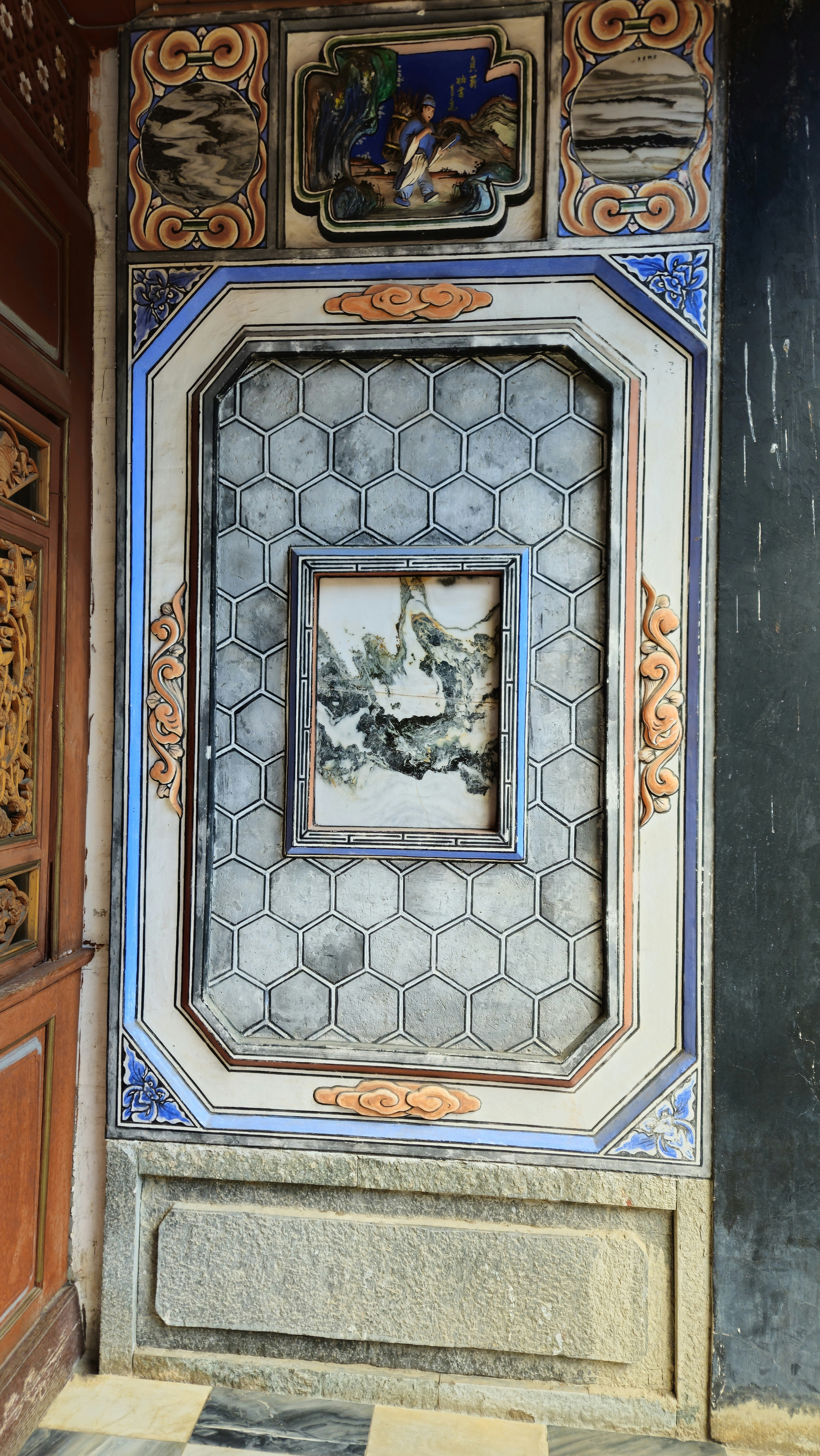 Ornate Hexagonal Panel Framed by Painted Motifs
