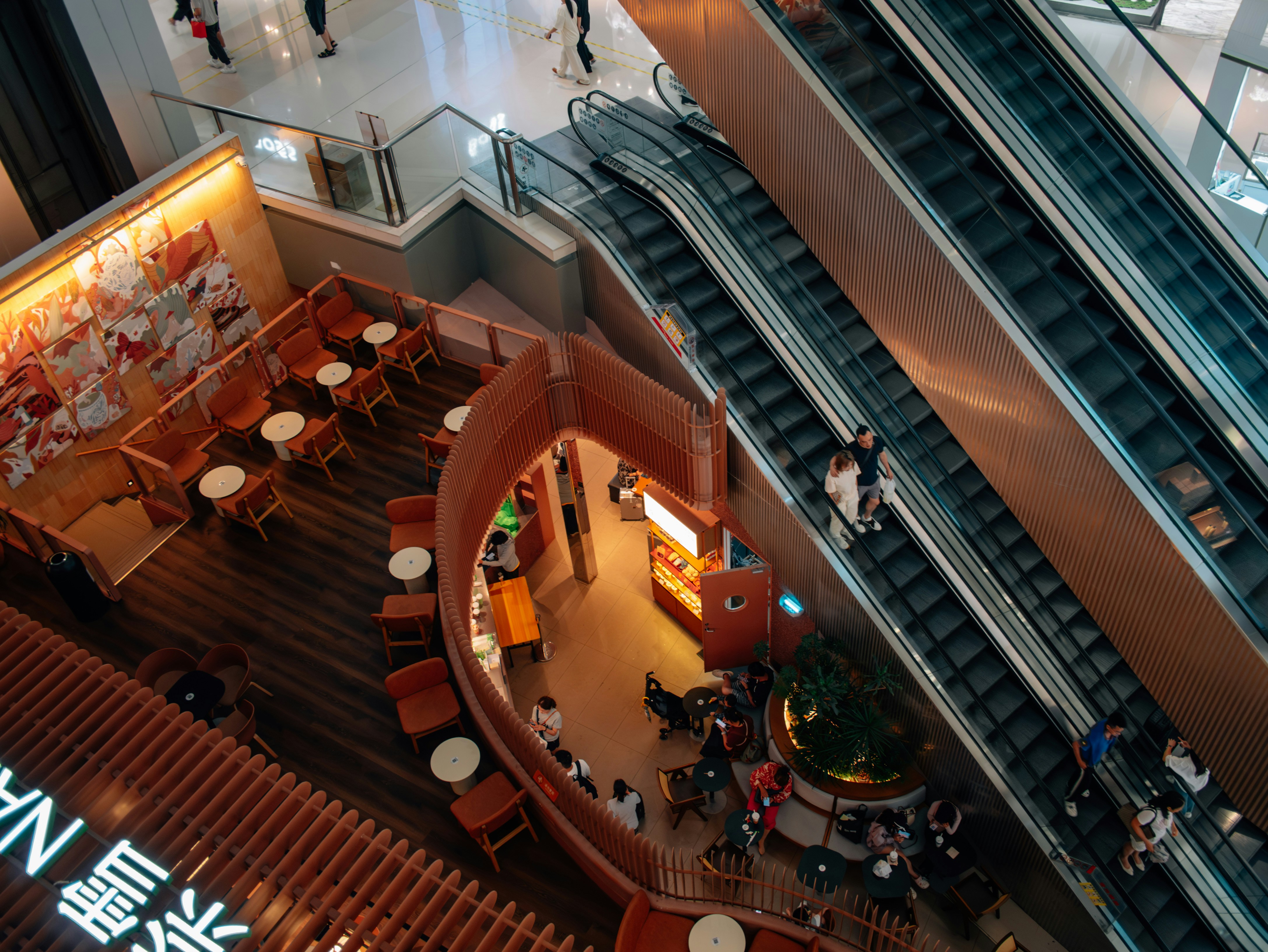 An overhead view of a restaurant with escalators photo – Free Building ...