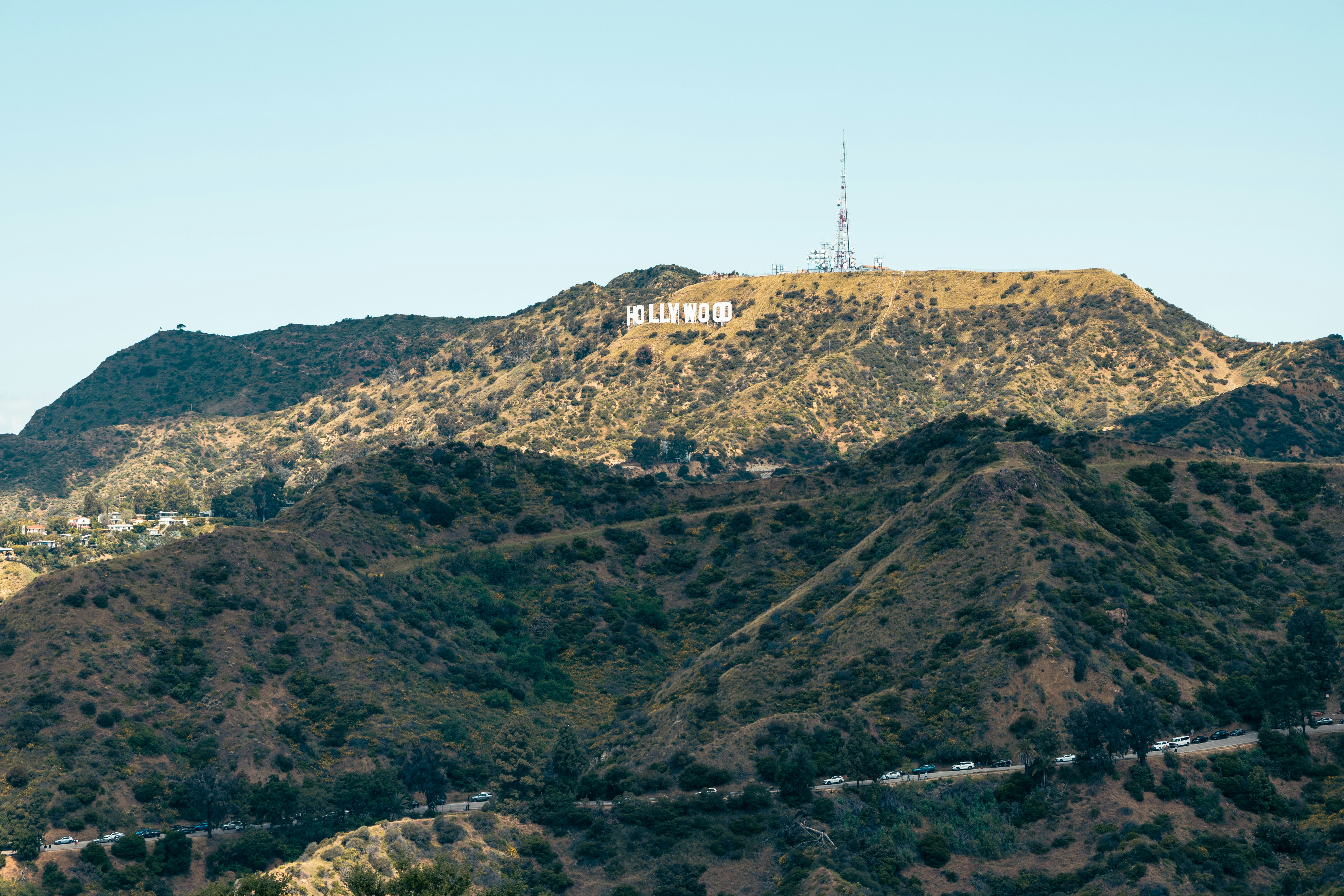A mountain with a radio tower on top of it photo – Free Griffith ...