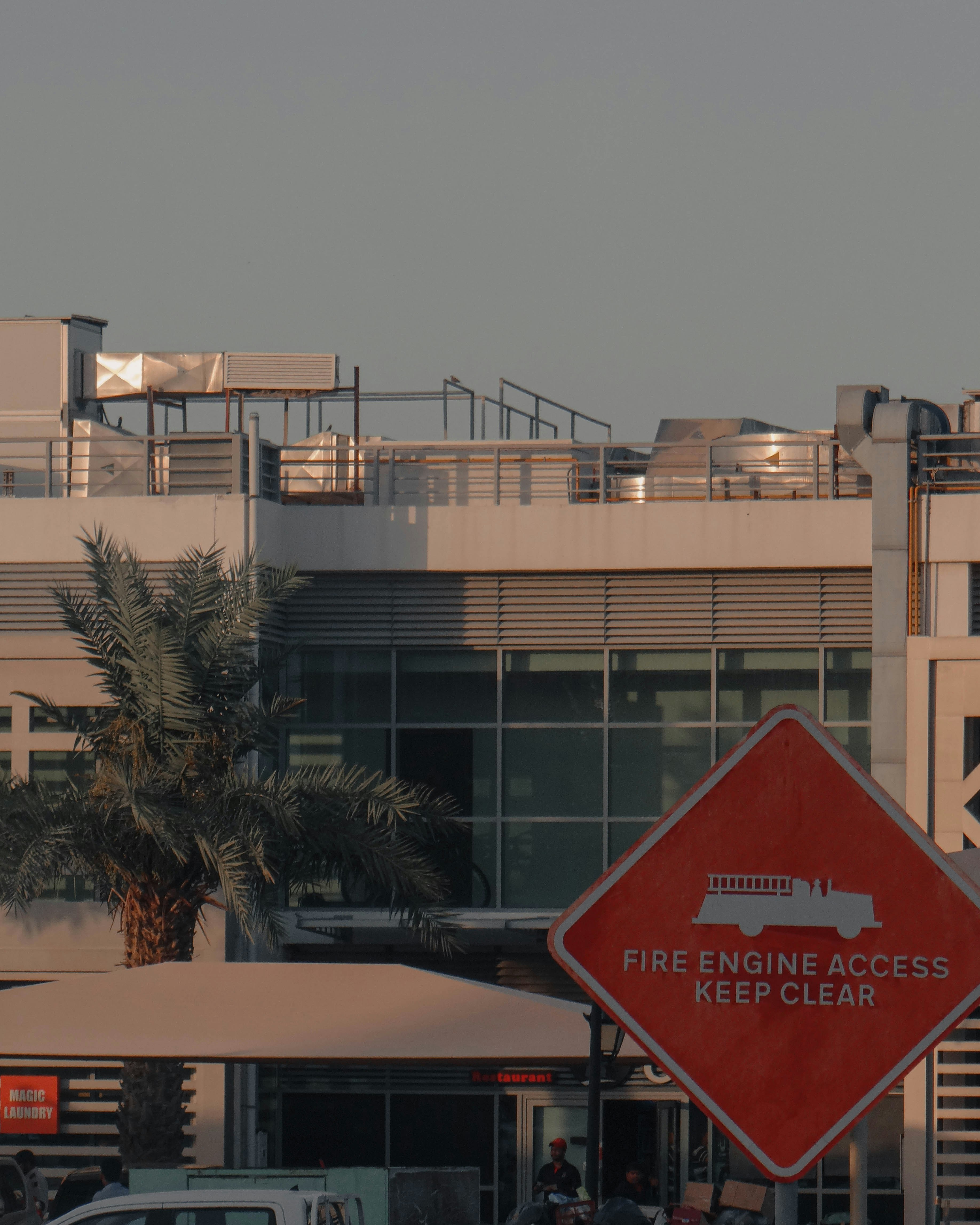 A fire engine access keep clear sign in front of a building photo ...