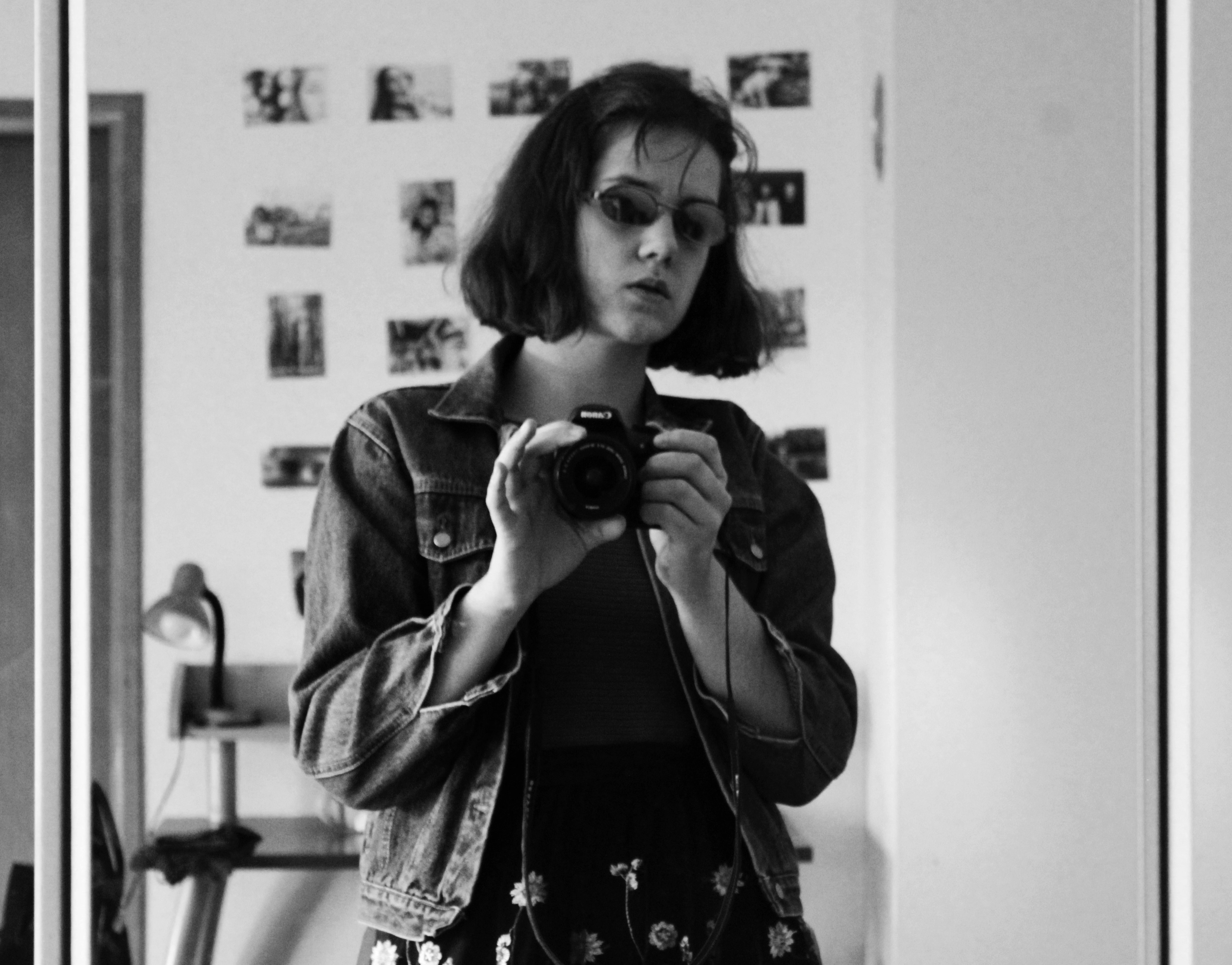 Denim and Shadows: A Quiet Mirror Portrait