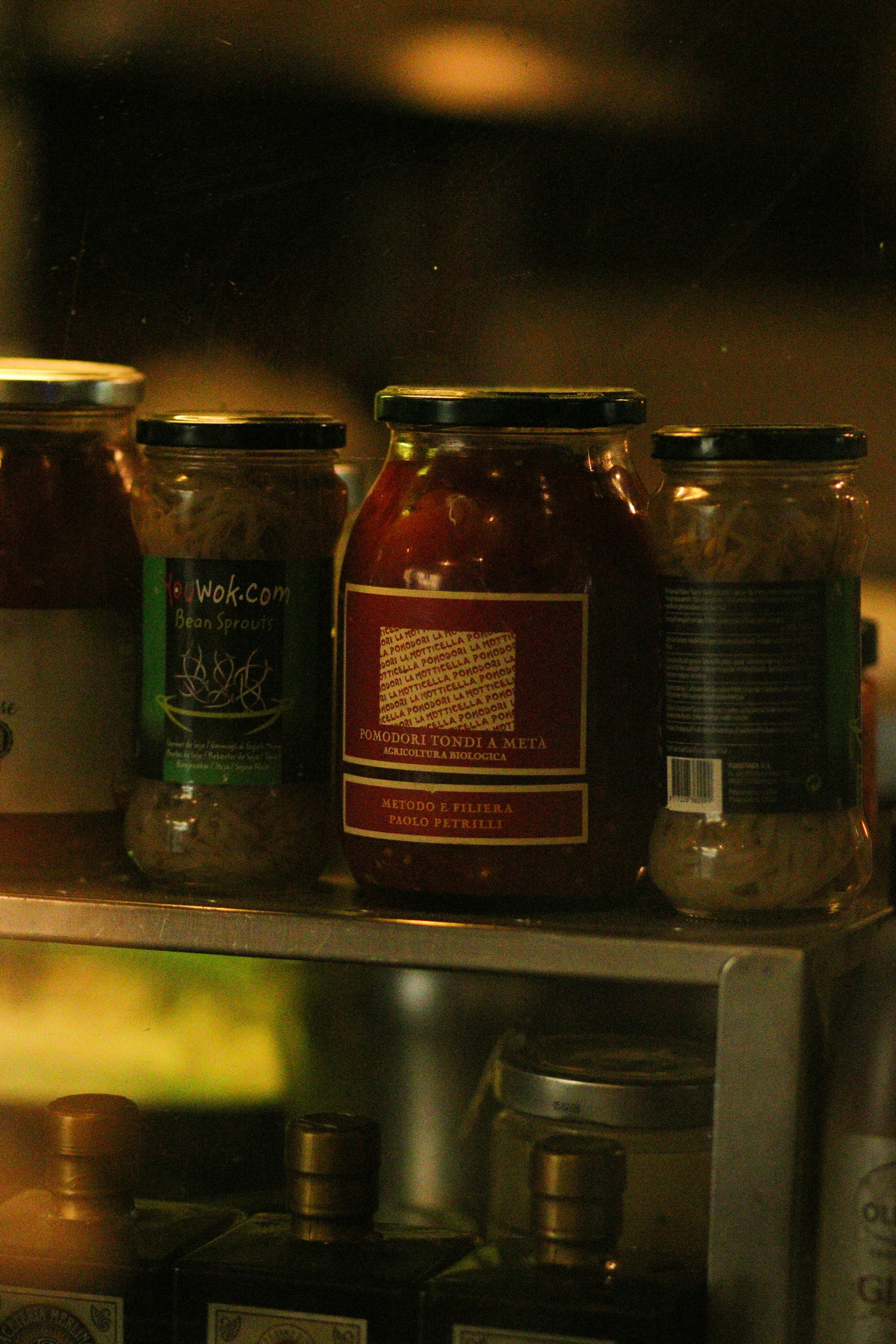 jars of food are sitting on a shelf