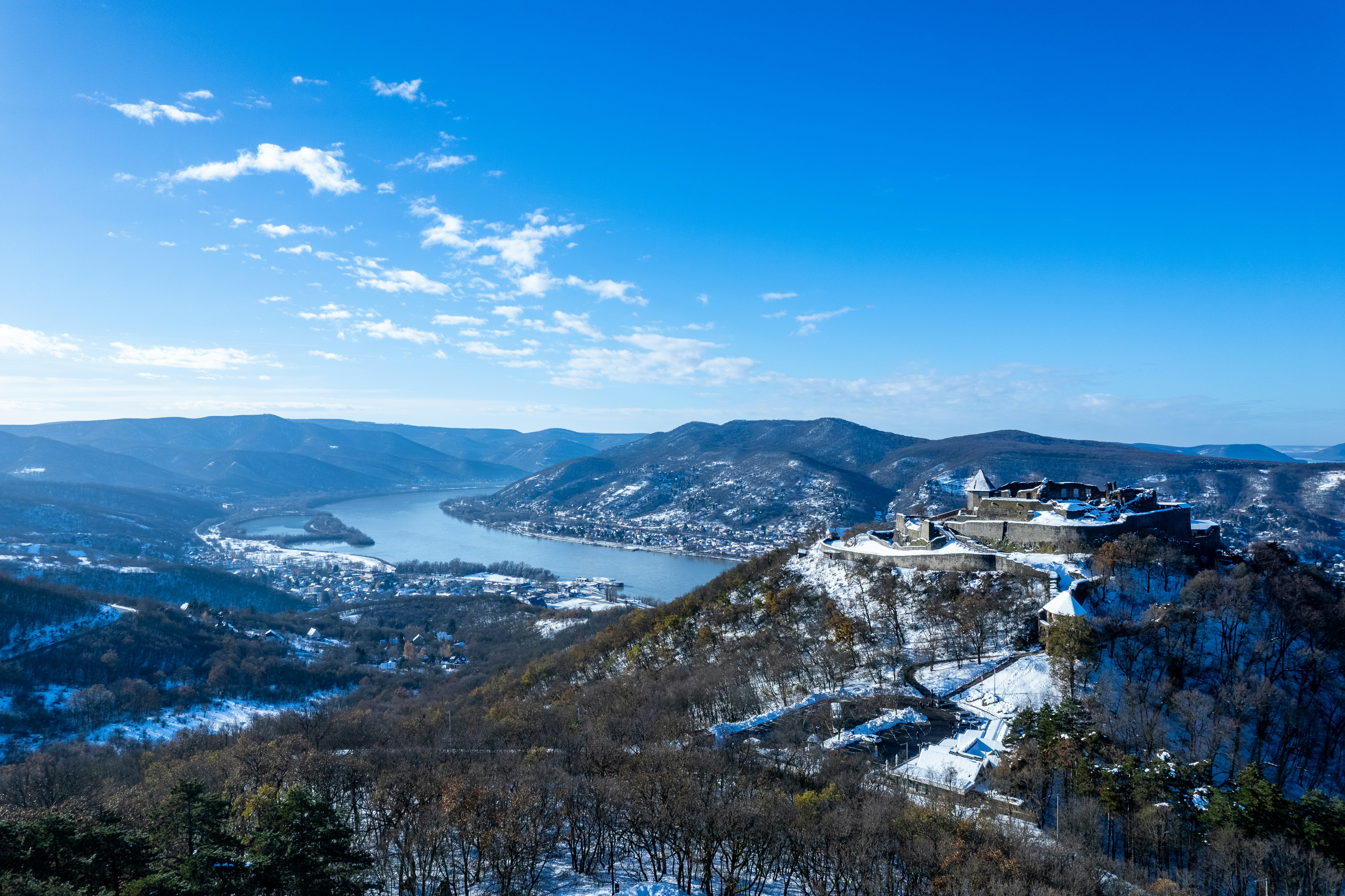 Snowbound Citadel Over a Snow-Dusted Lake Valley