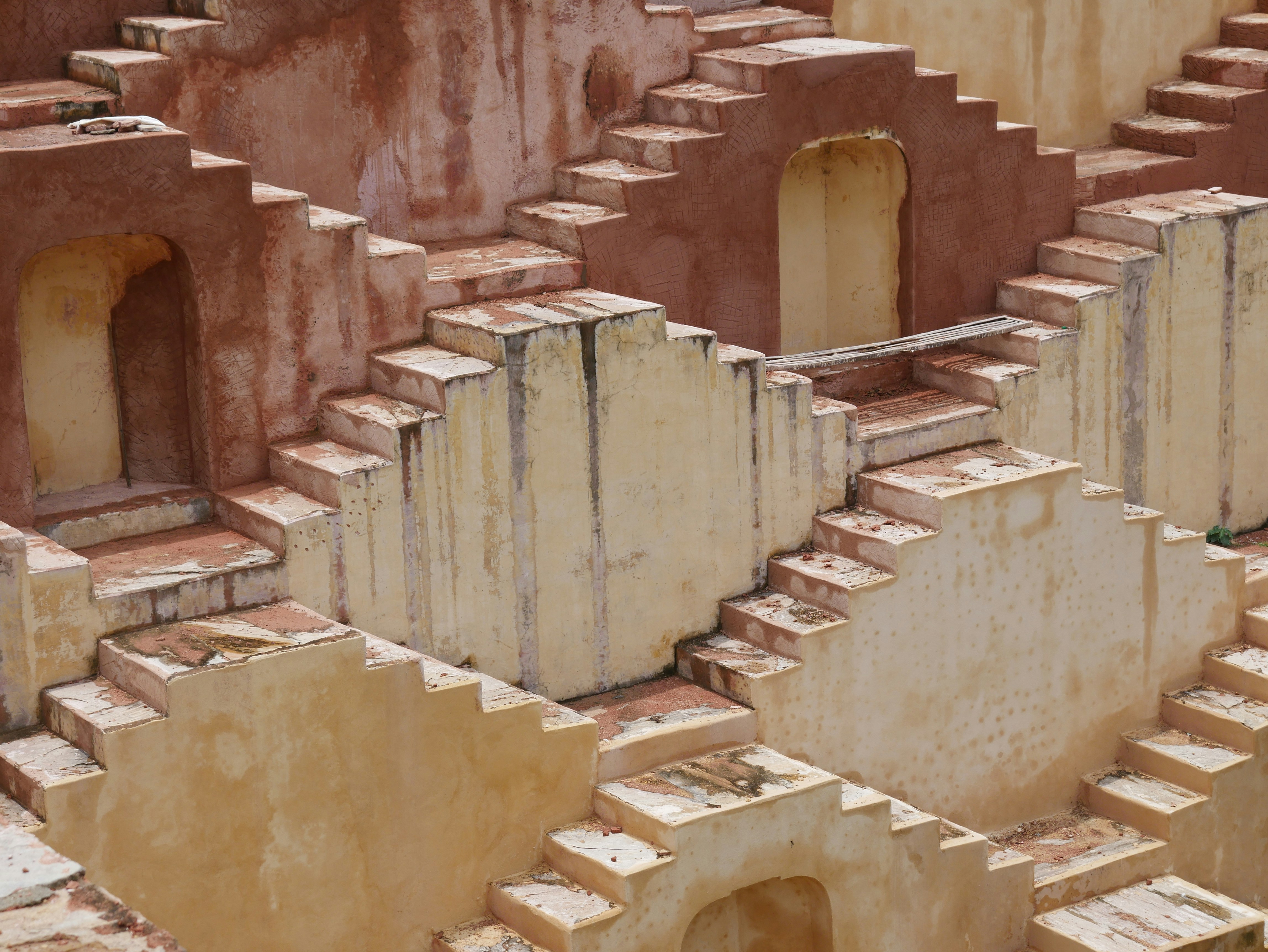 A group of buildings made out of bricks photo – Free Panna meena ka ...