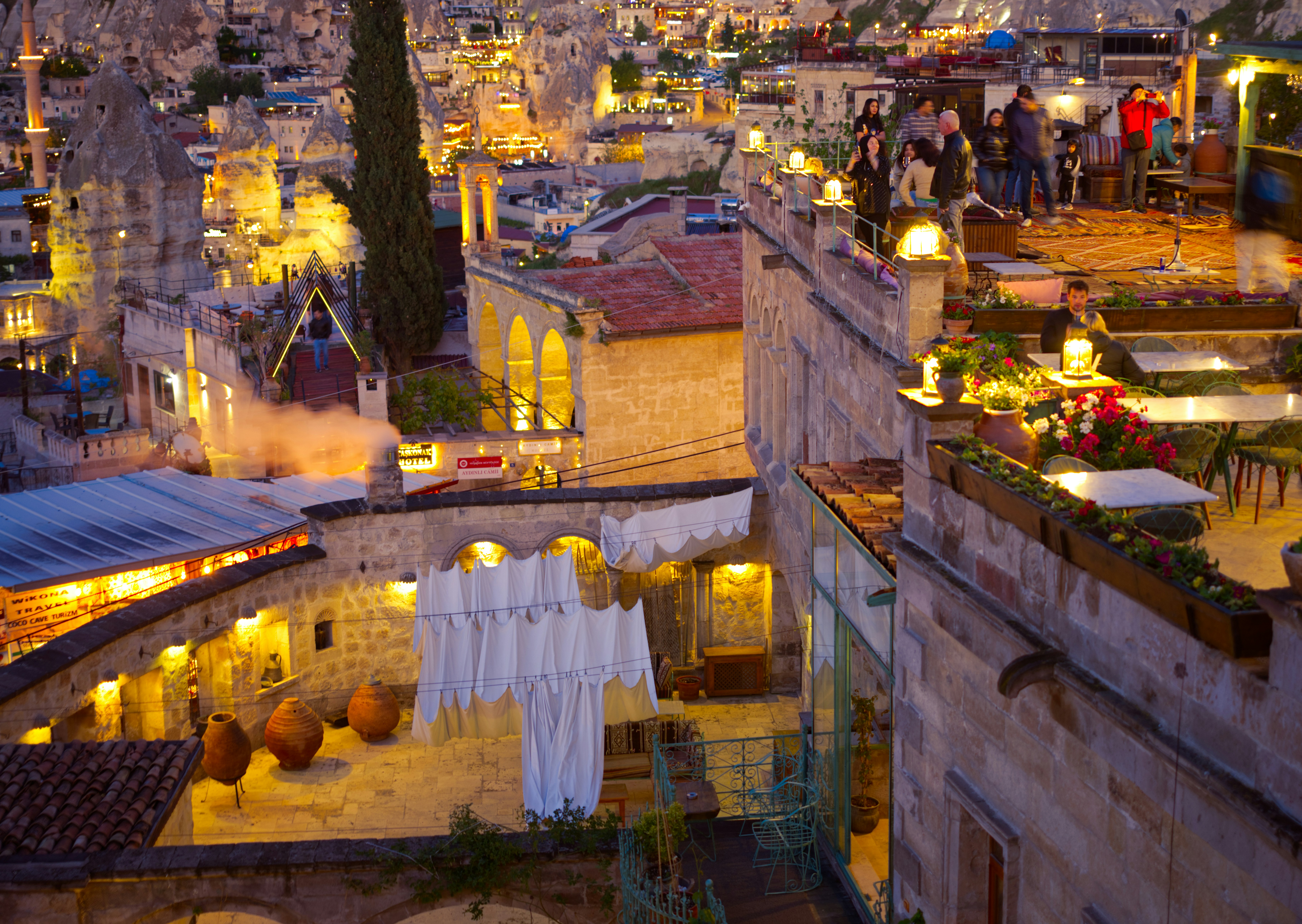 Rooftop Lanterns Over a Historic Terrace in Warm Evening Light