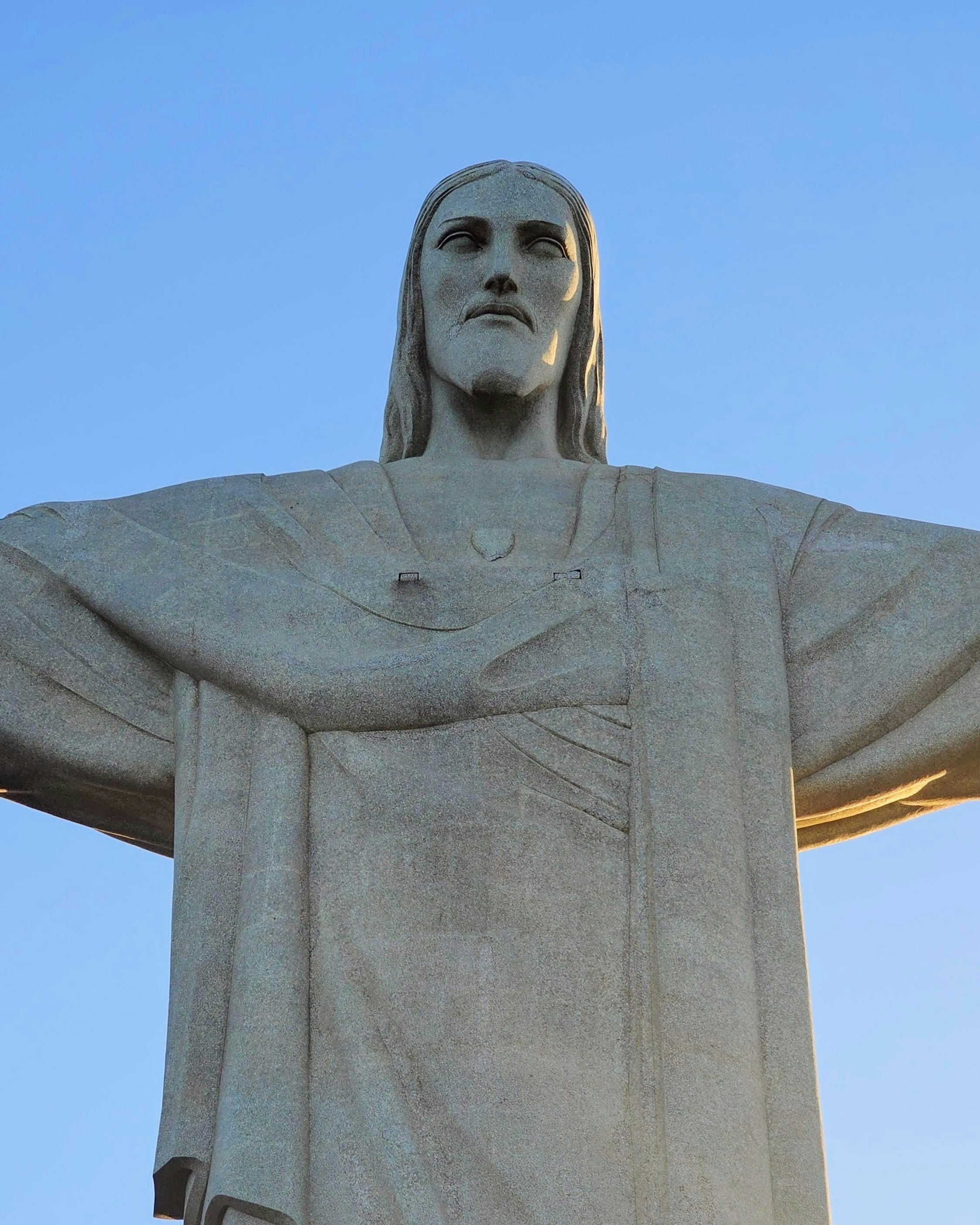 Christ the redeemer Rio de Janeiro, Brazil. | a statue of jesus with his arms outstretched