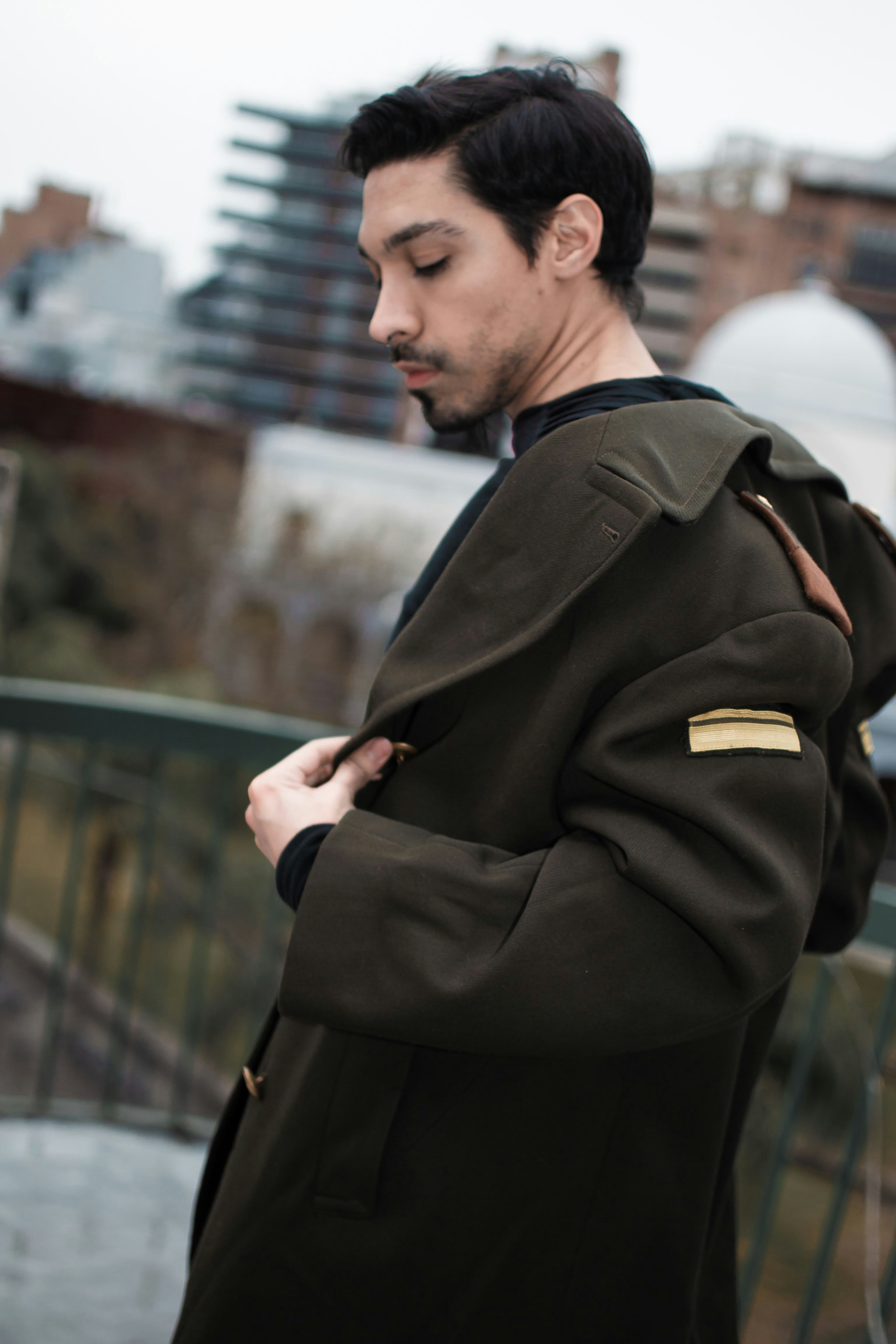 Rooftop Portrait: Quiet Introspection in a Cityscape