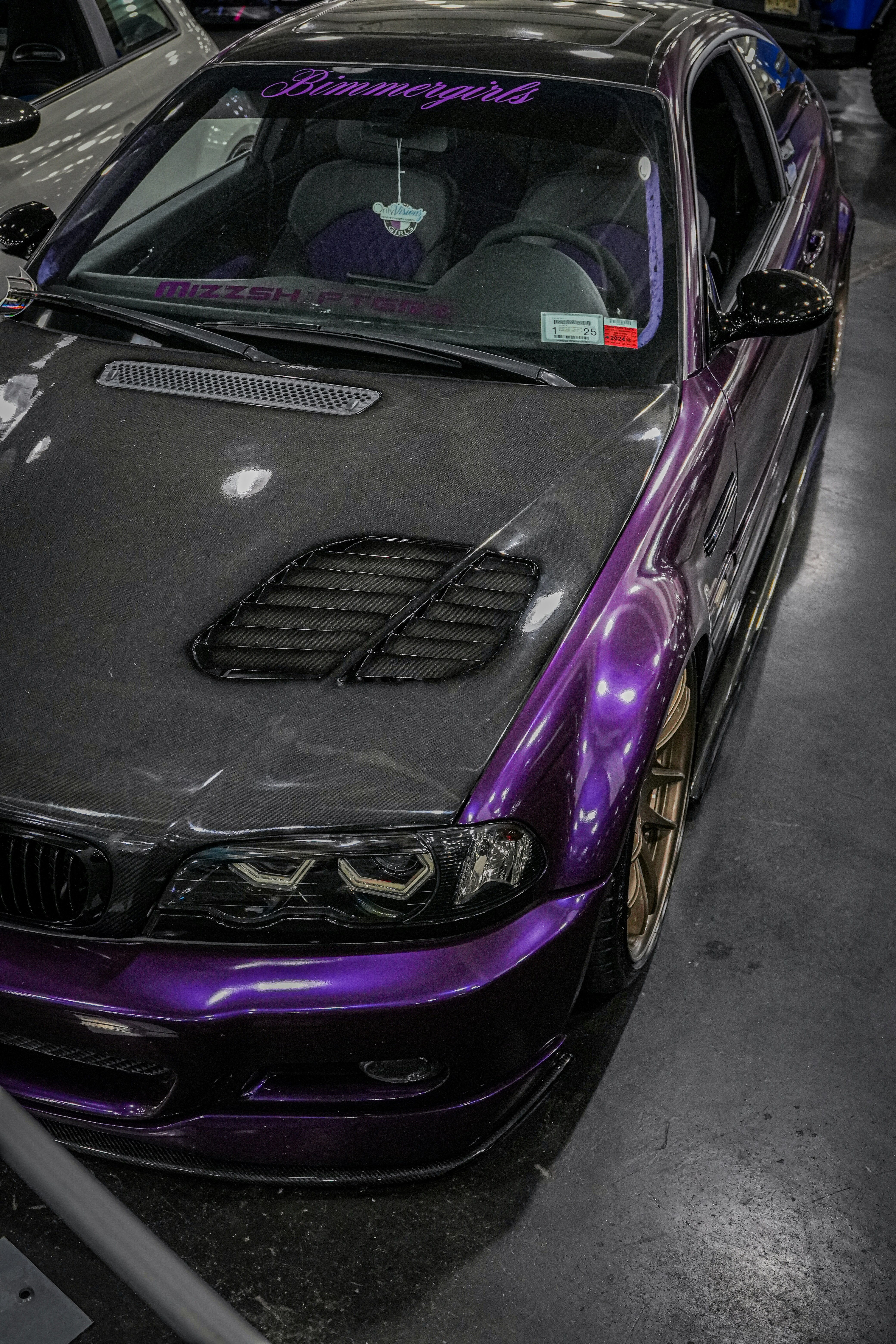 Midnight Violet: Carbon-Fiber Front End in a Showroom Glow