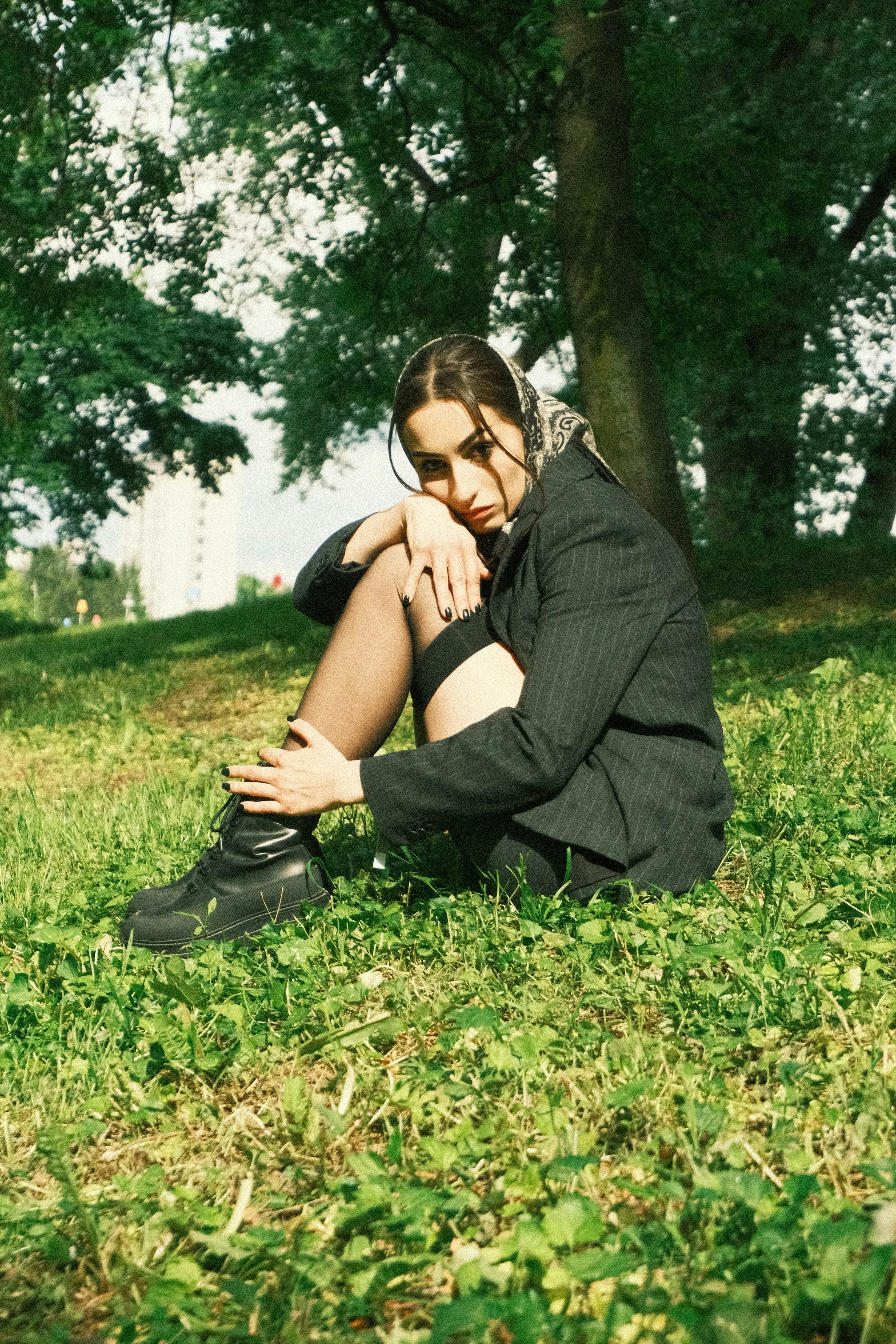 Urban Quietude: A Portrait in Shadow and Grass