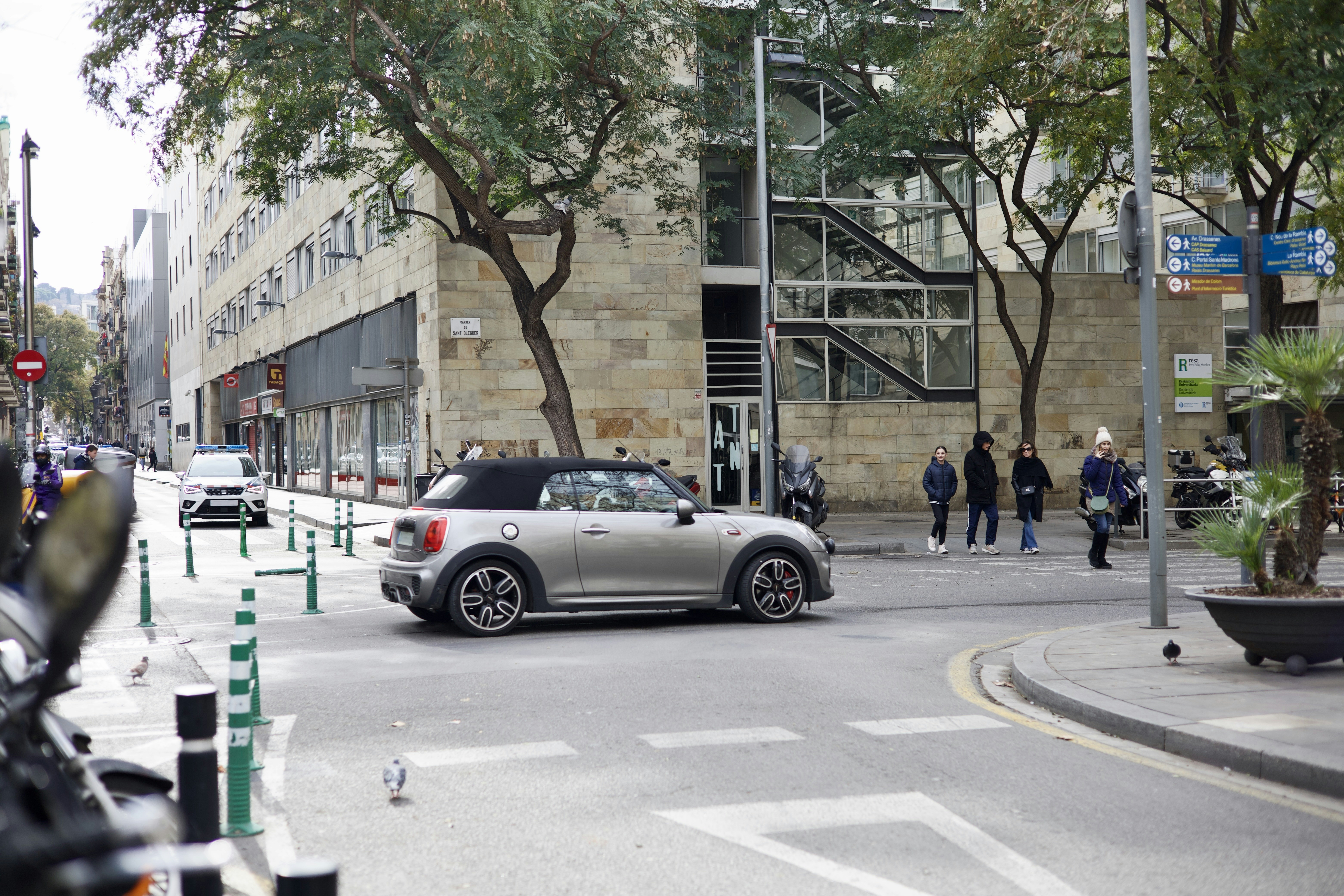 Grey Mini Cooper in Barcelona street.