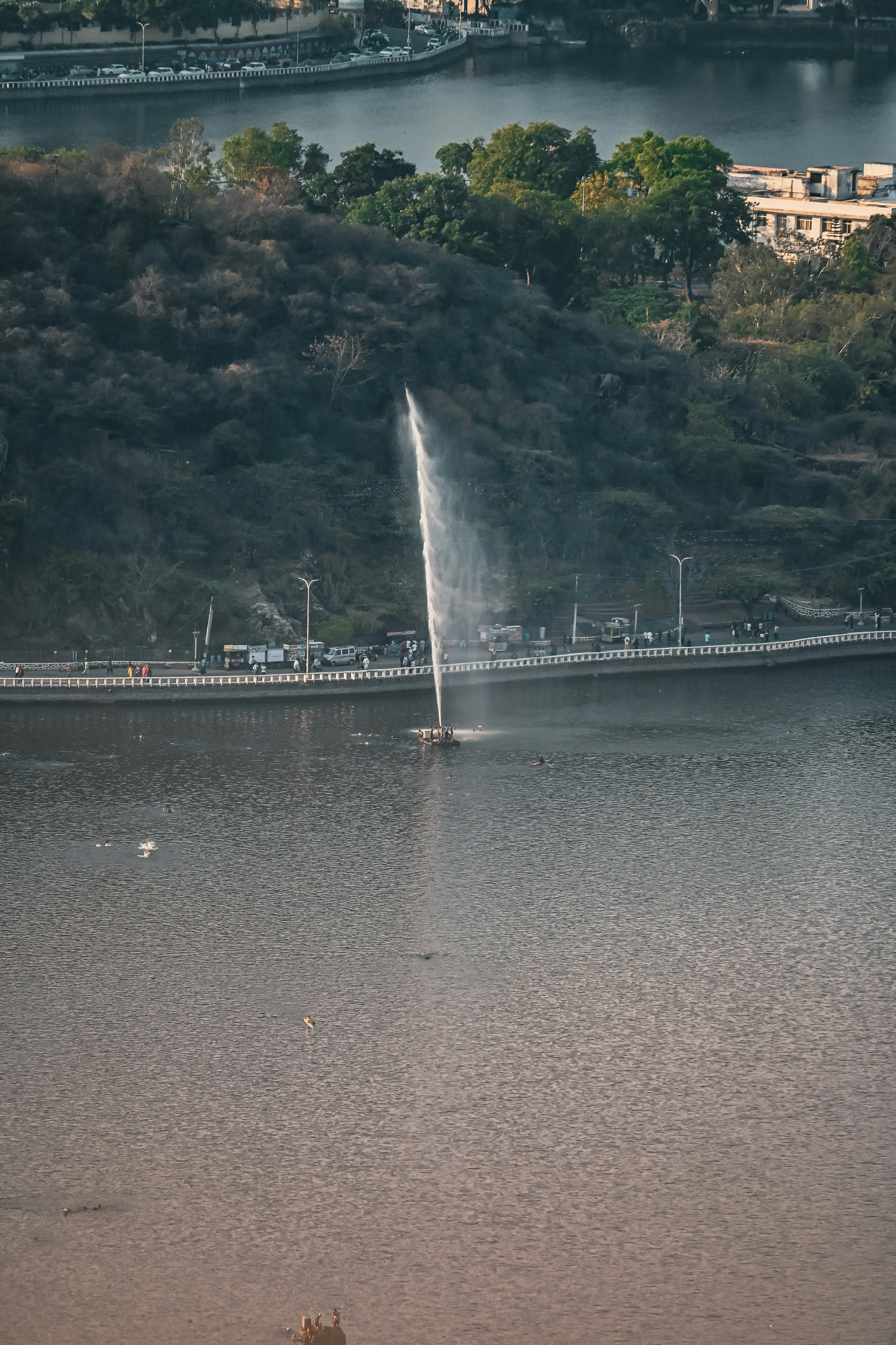 A water spewer spewing water into the air photo – Free Grey Image on ...