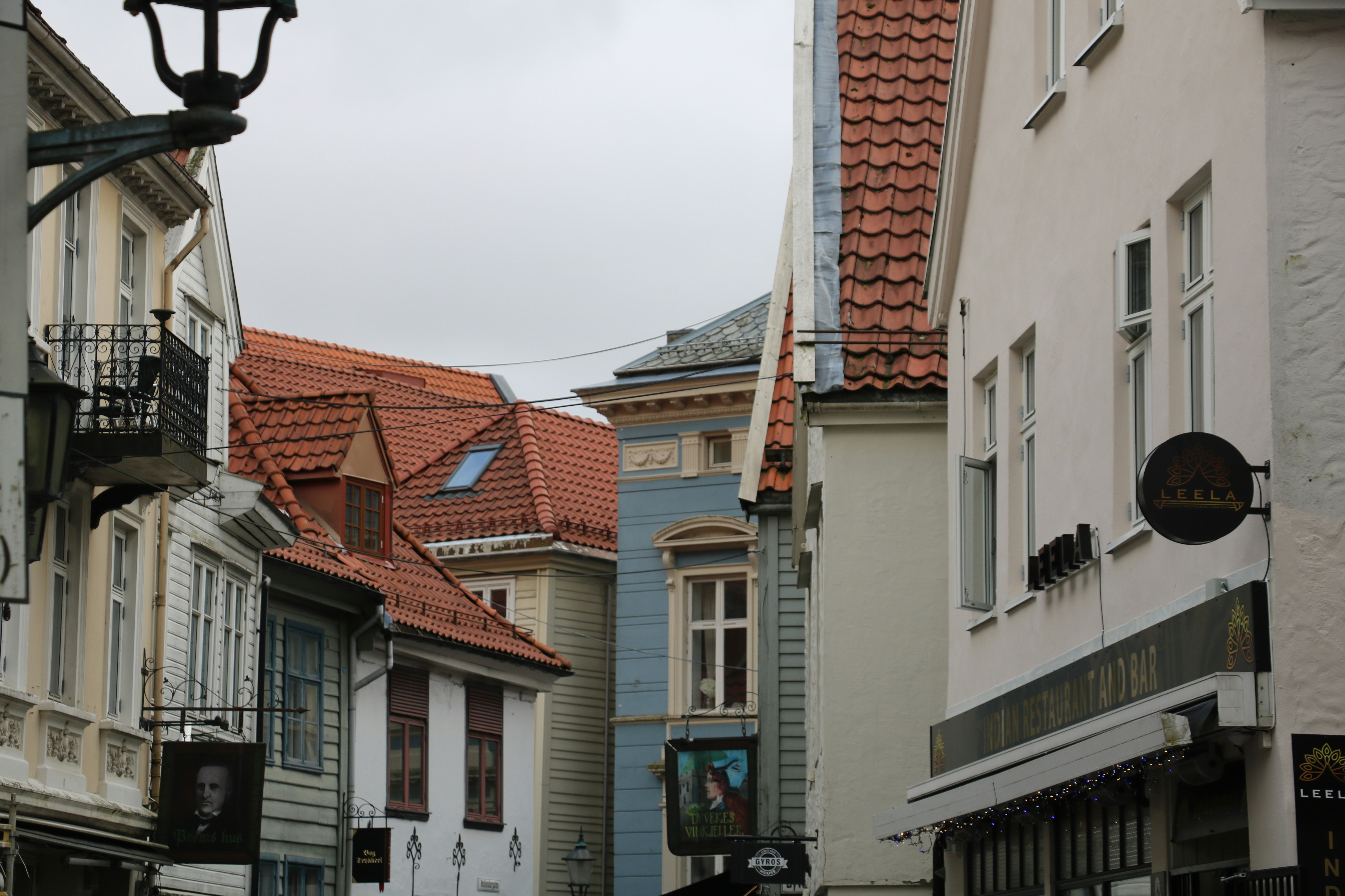 Blue Facade at the Heart of a Narrow European Street