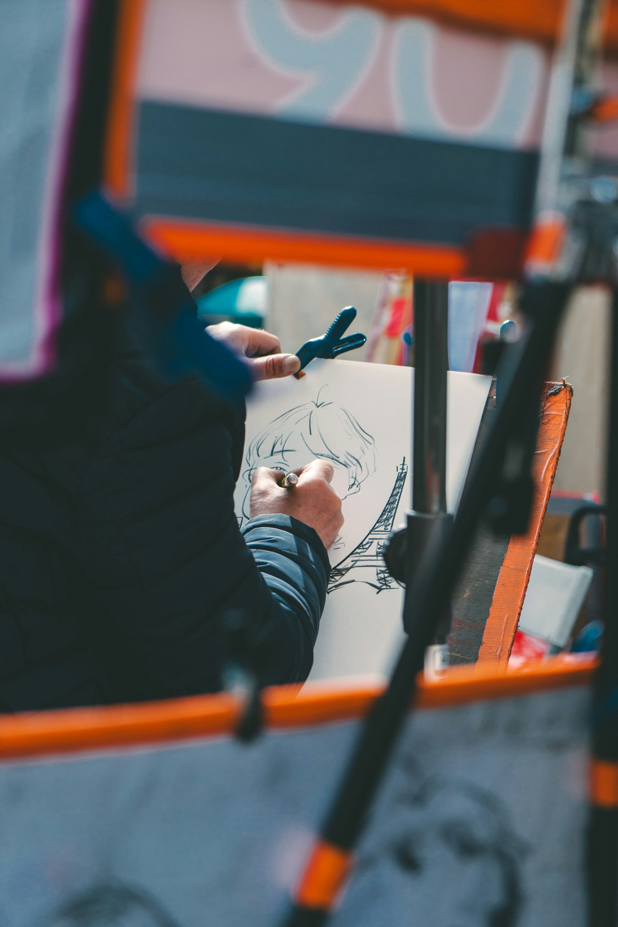 Sketching in the Studio: Hand, Marker, and Portrait on the Easel