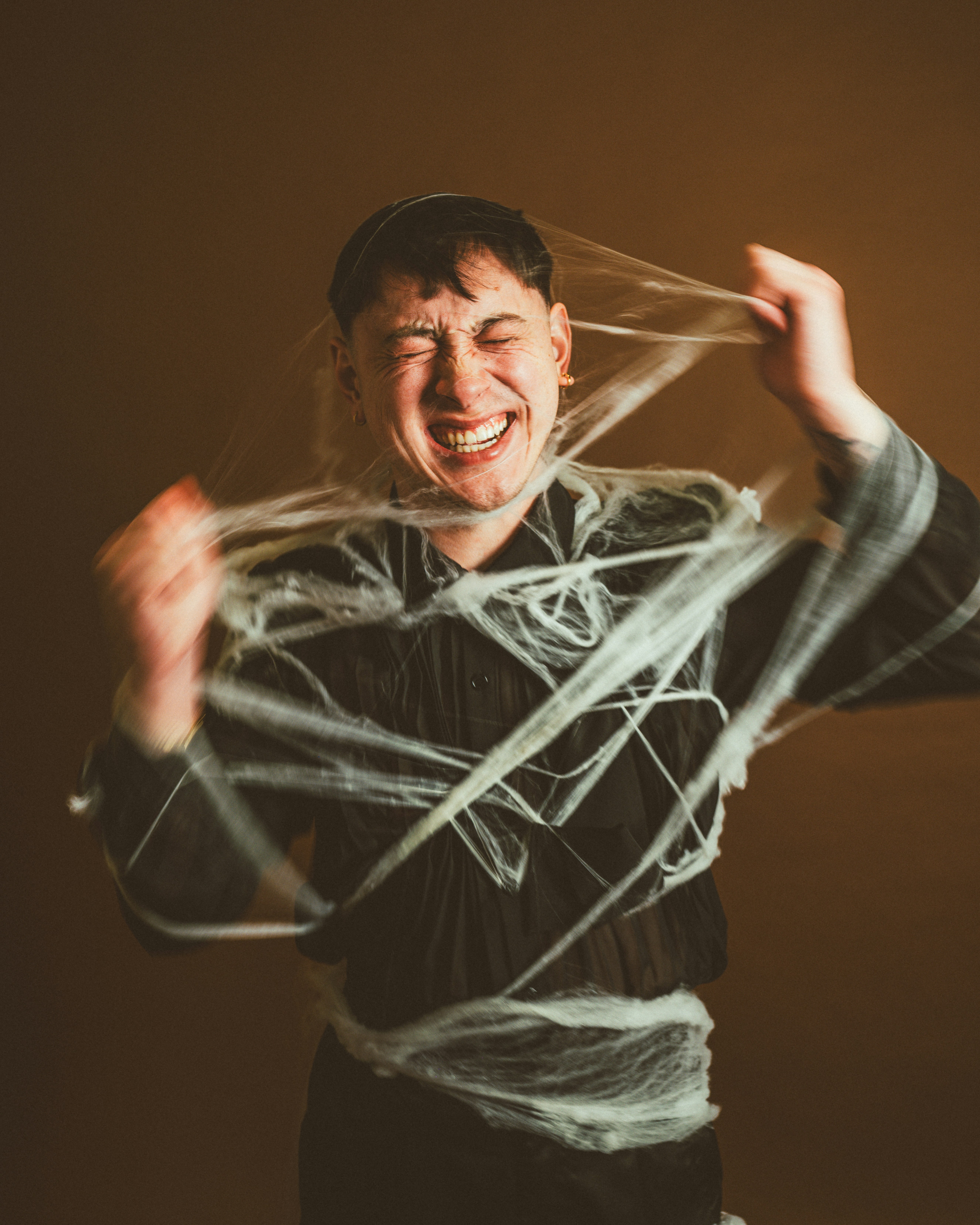 A man with a string wrapped around his face photo – Free Grey Image on ...