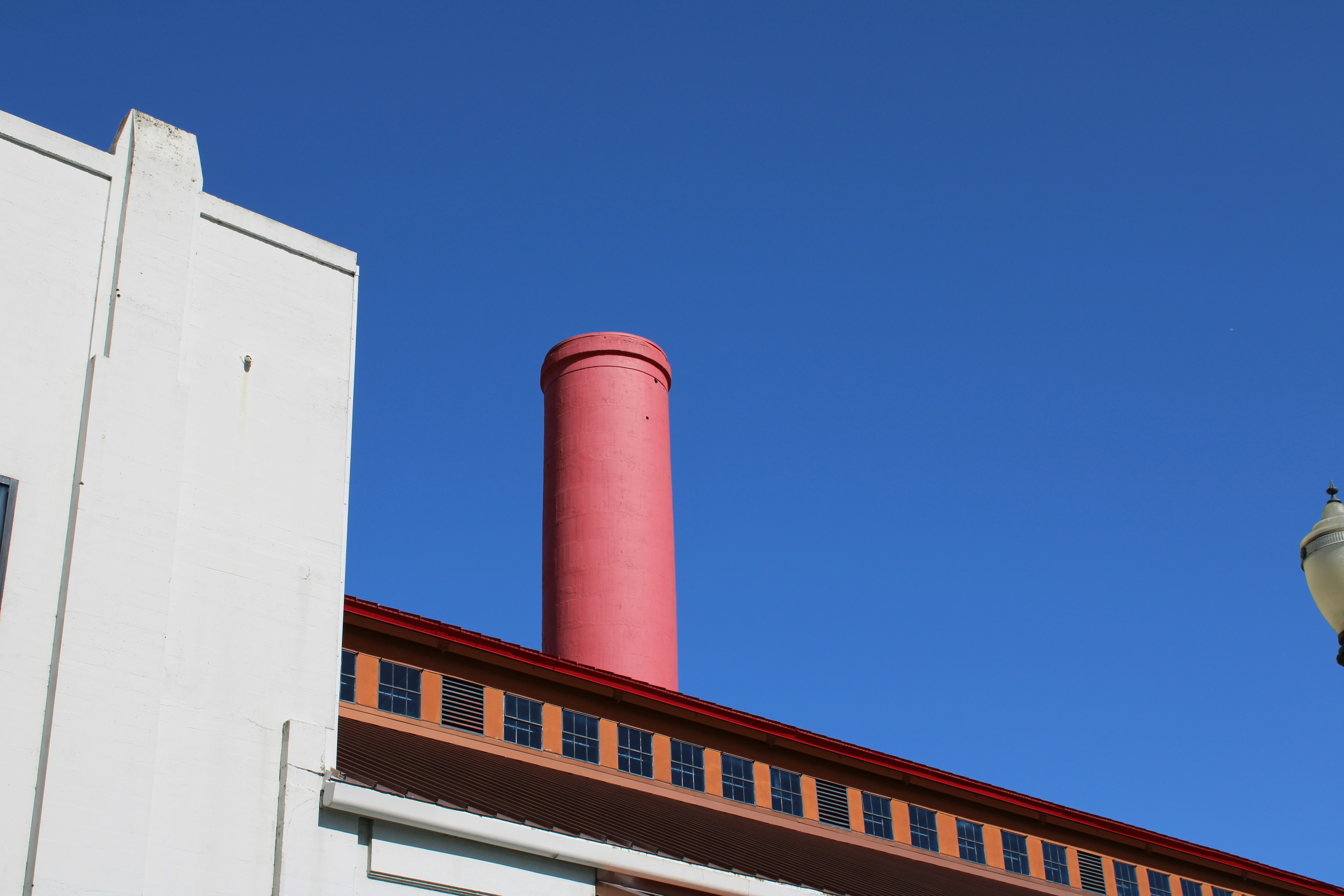 Crimson Chimney Reaches Against a Cobalt Sky