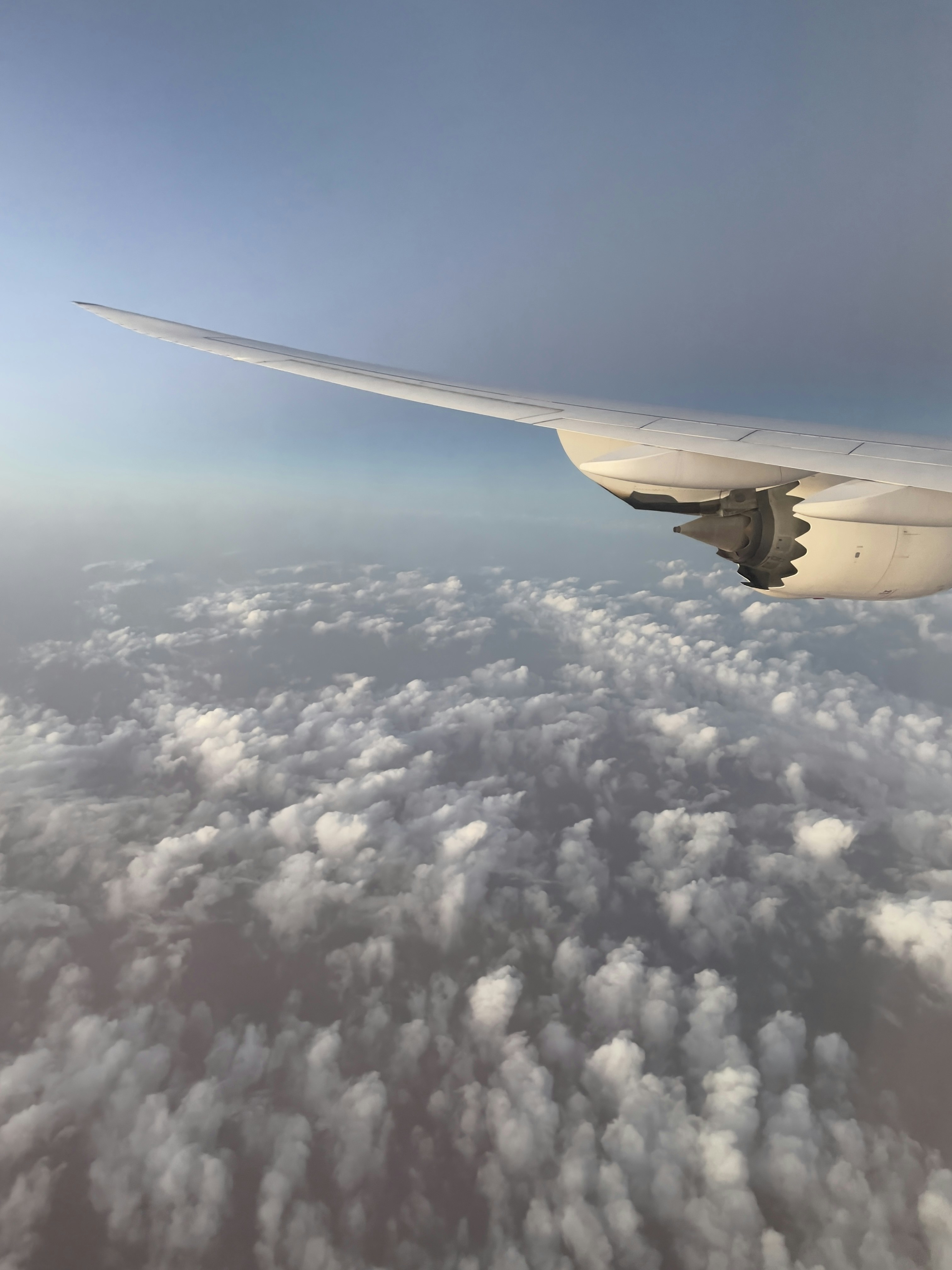 Wingtip Drift: Aerial Light Over a Sea of Clouds