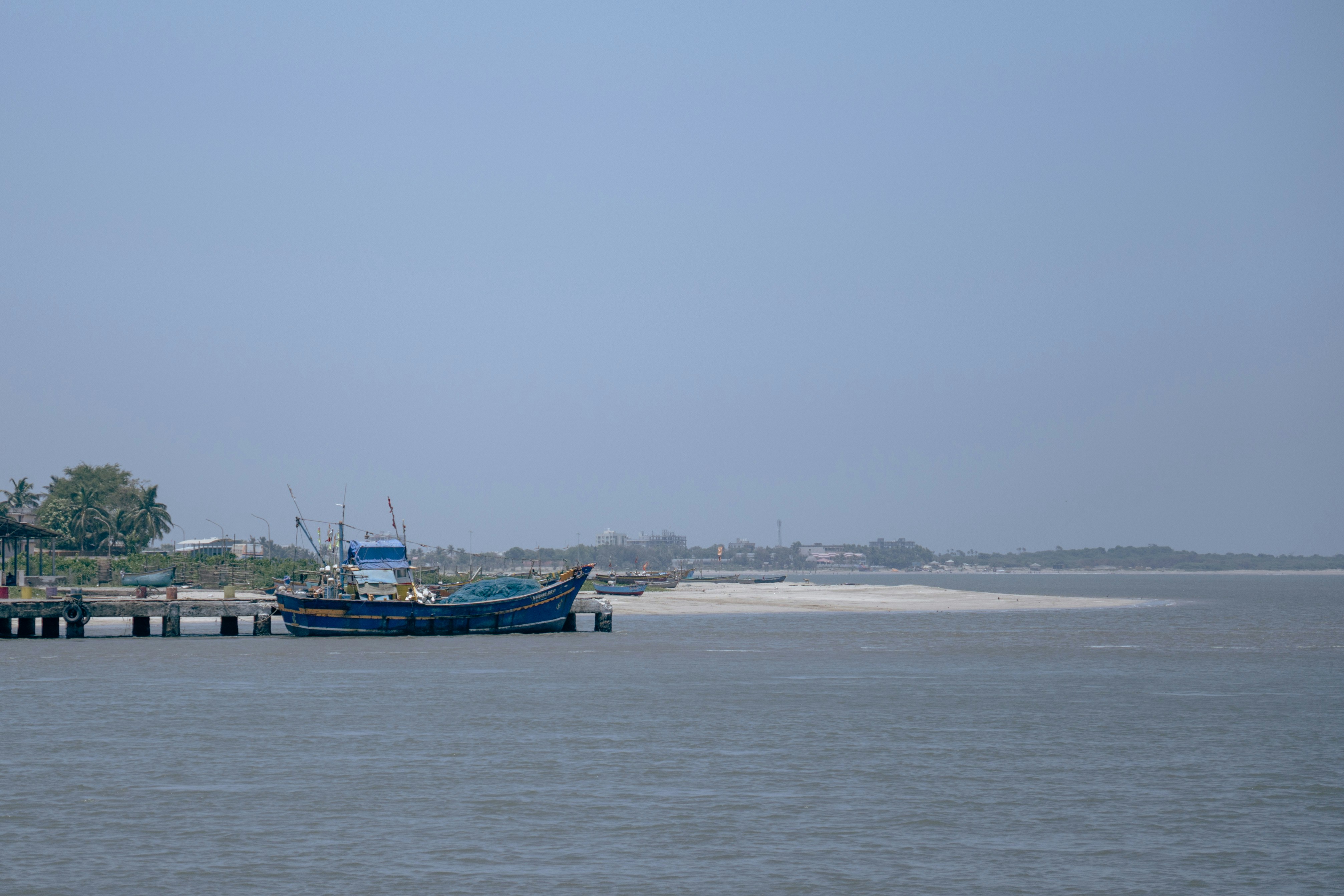 Harbor's Quiet Embrace: A Fisherman's Refuge