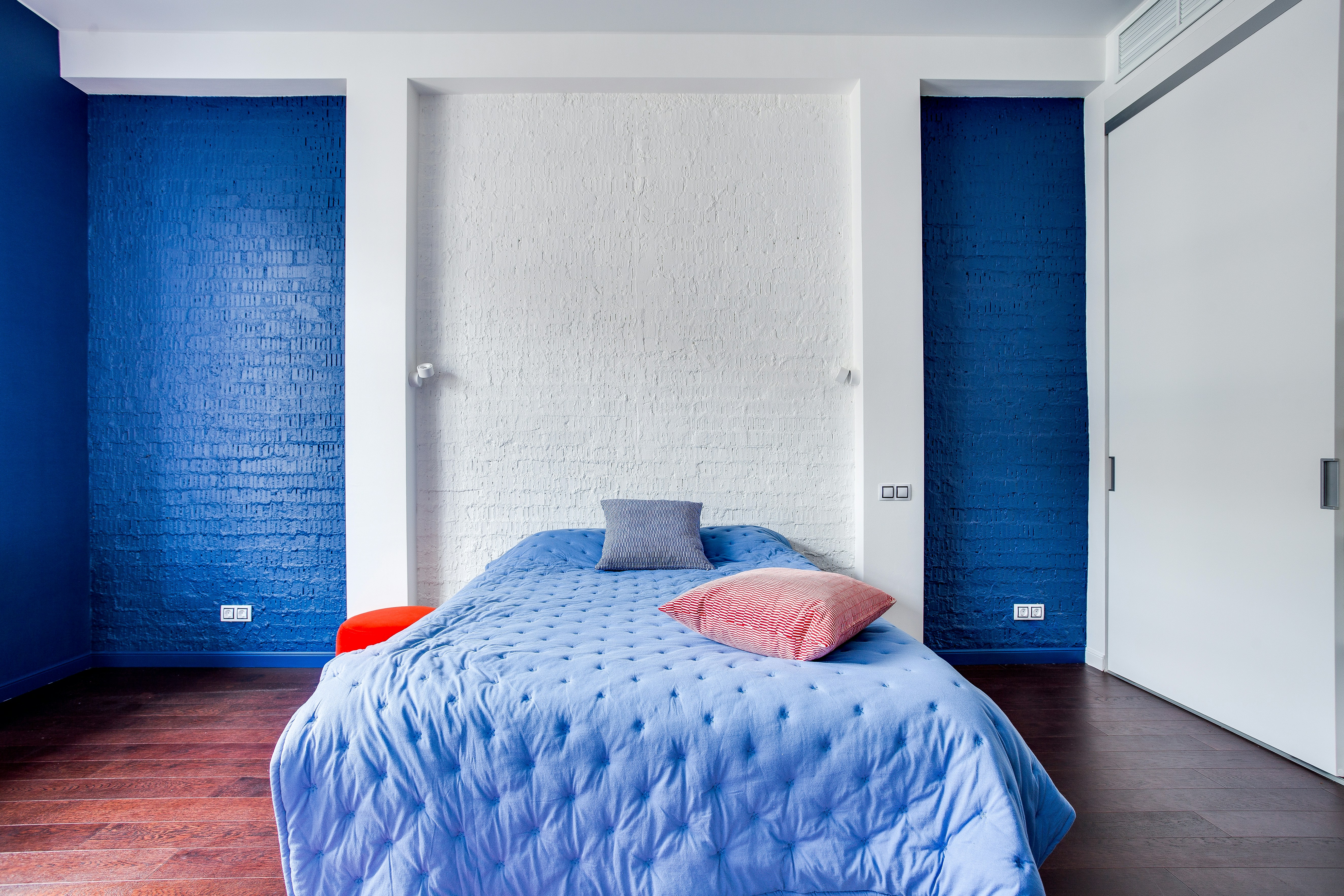 A bedroom with blue walls and a blue bed photo – Free Blue Image on ...