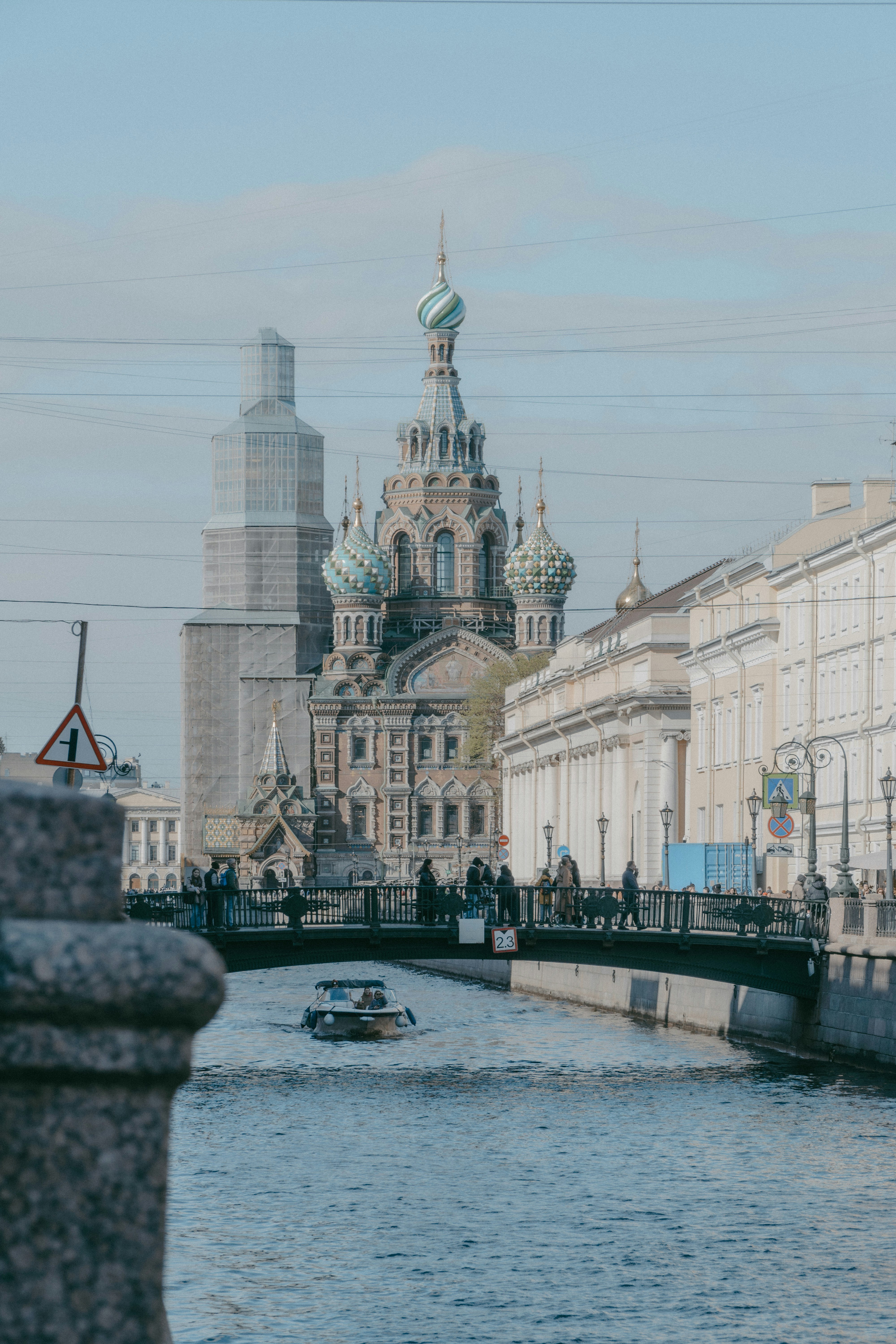 Domes and Rails: Onion-Spired Cathedral Framed by a Riverside Bridge