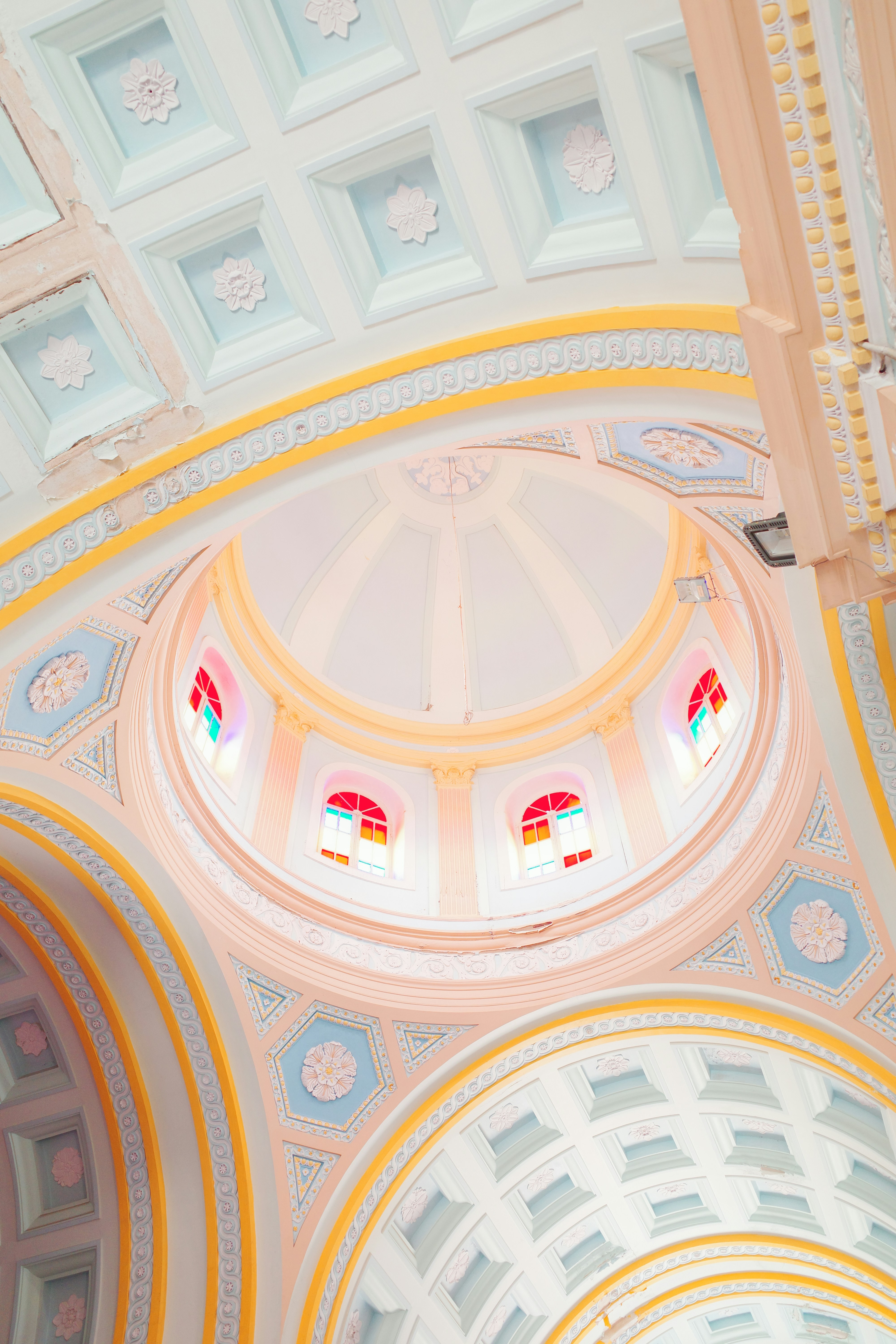 Celestial Vault: pastel arches and stained glass illuminating a grand dome