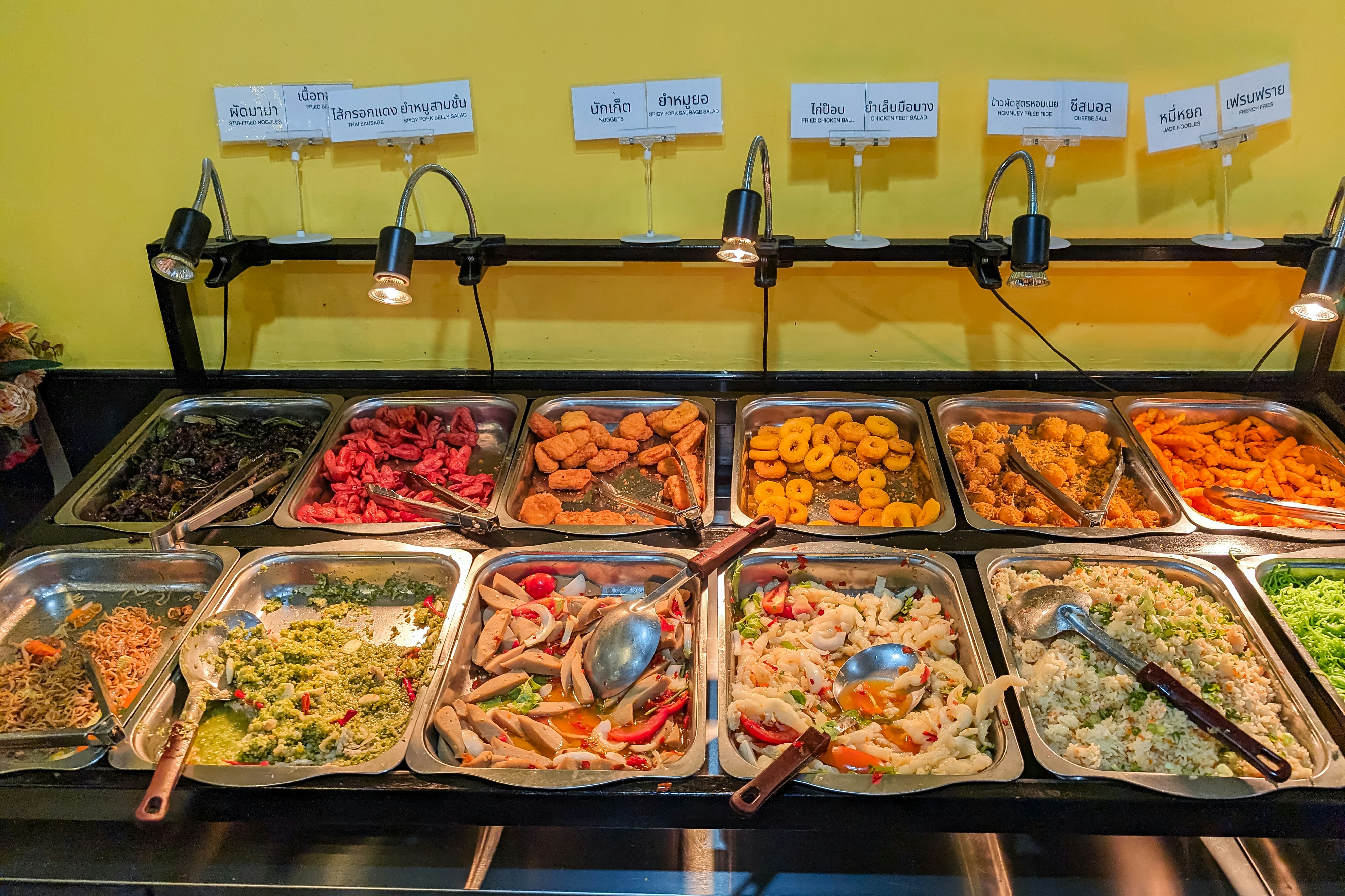 A buffet table filled with lots of different types of food photo – Free ...