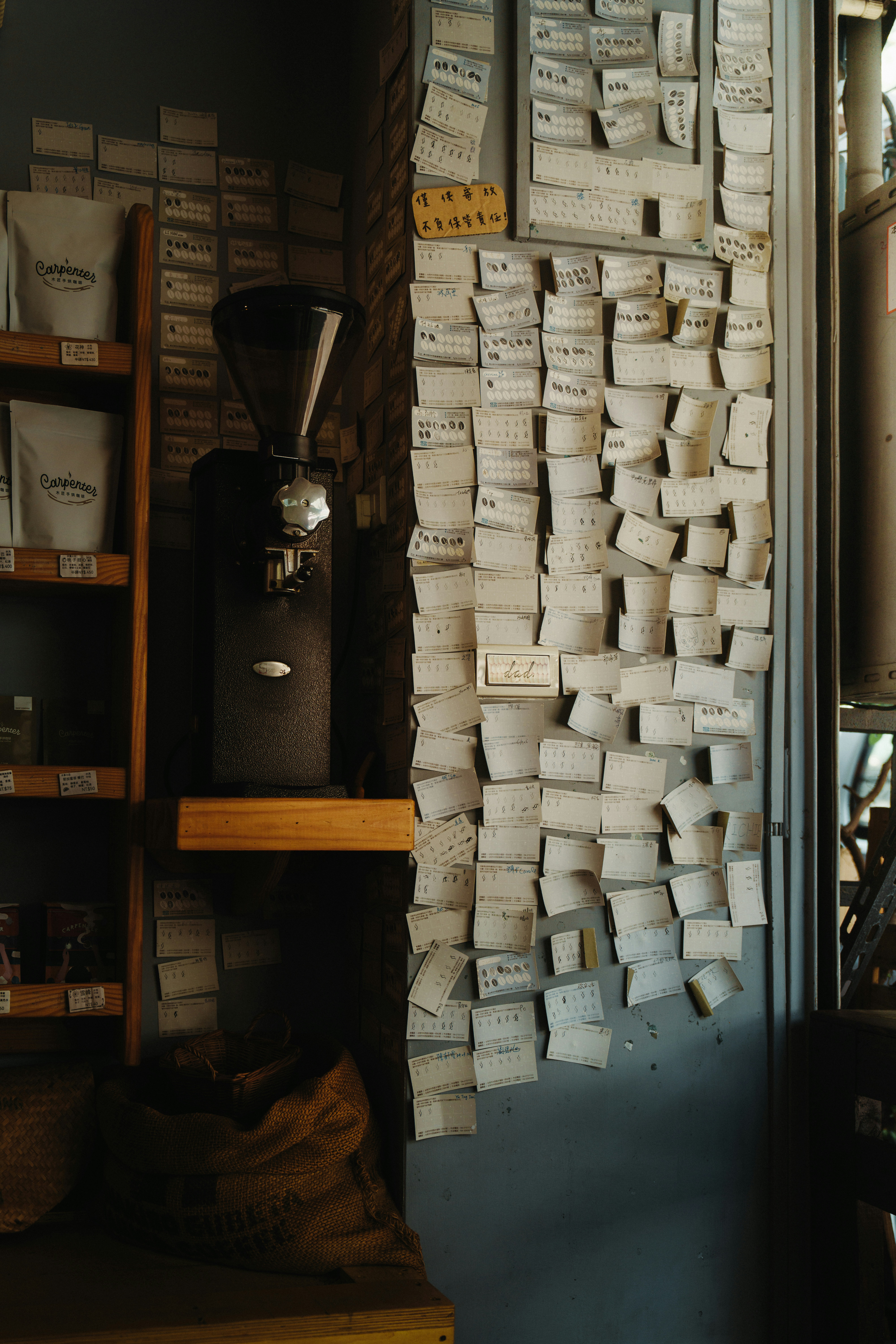 A room with a bunch of papers on the wall photo – Free Interior design ...