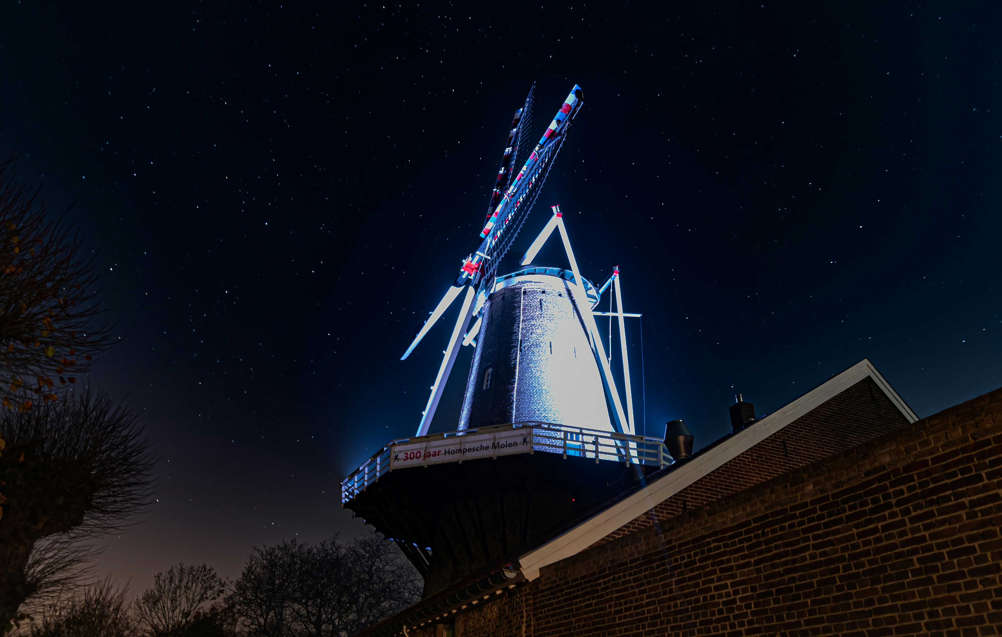 Night Windmill Under a Starry Sky