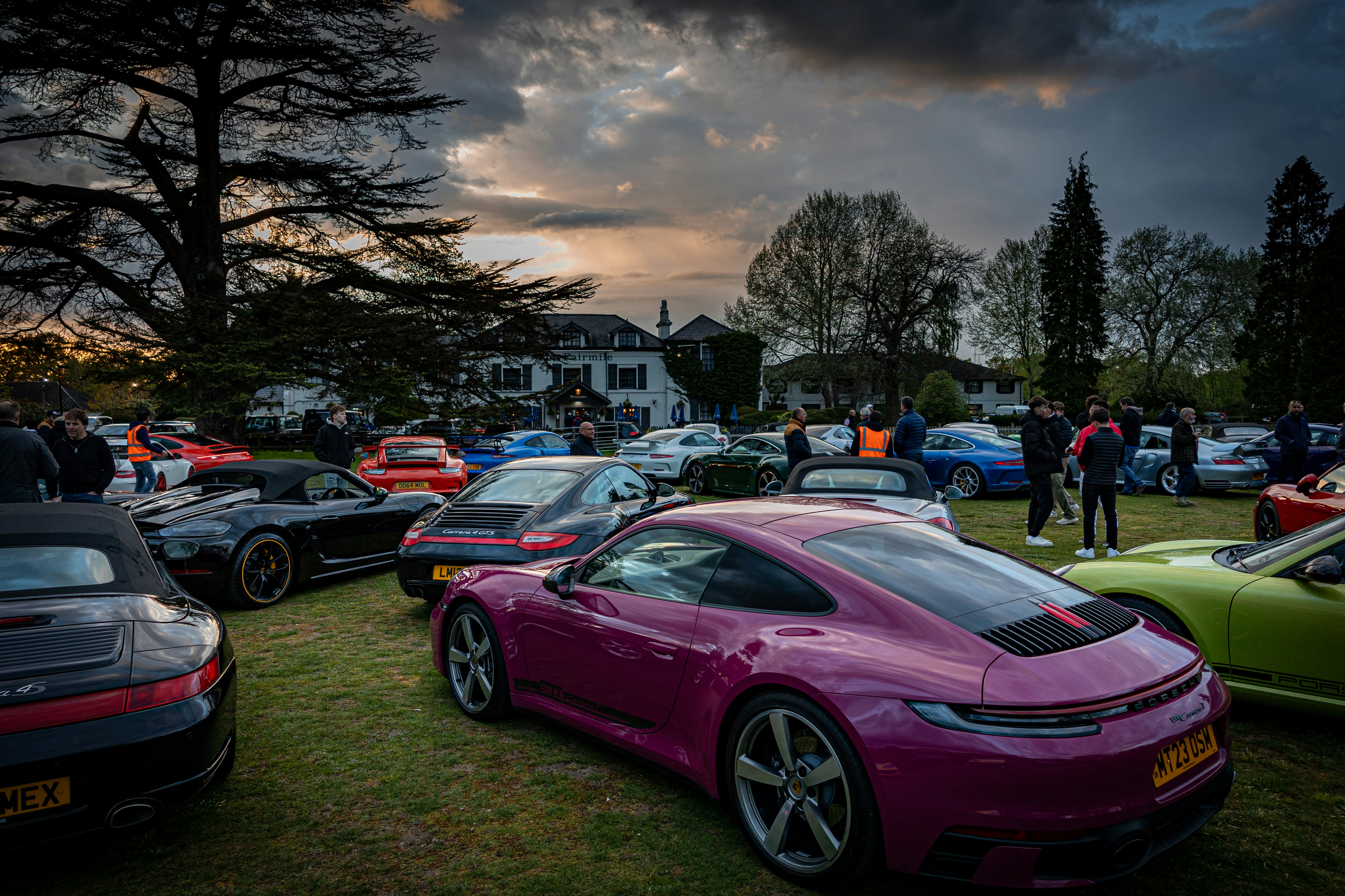 A bunch of cars that are parked in the grass photo – Free Fairmile ...