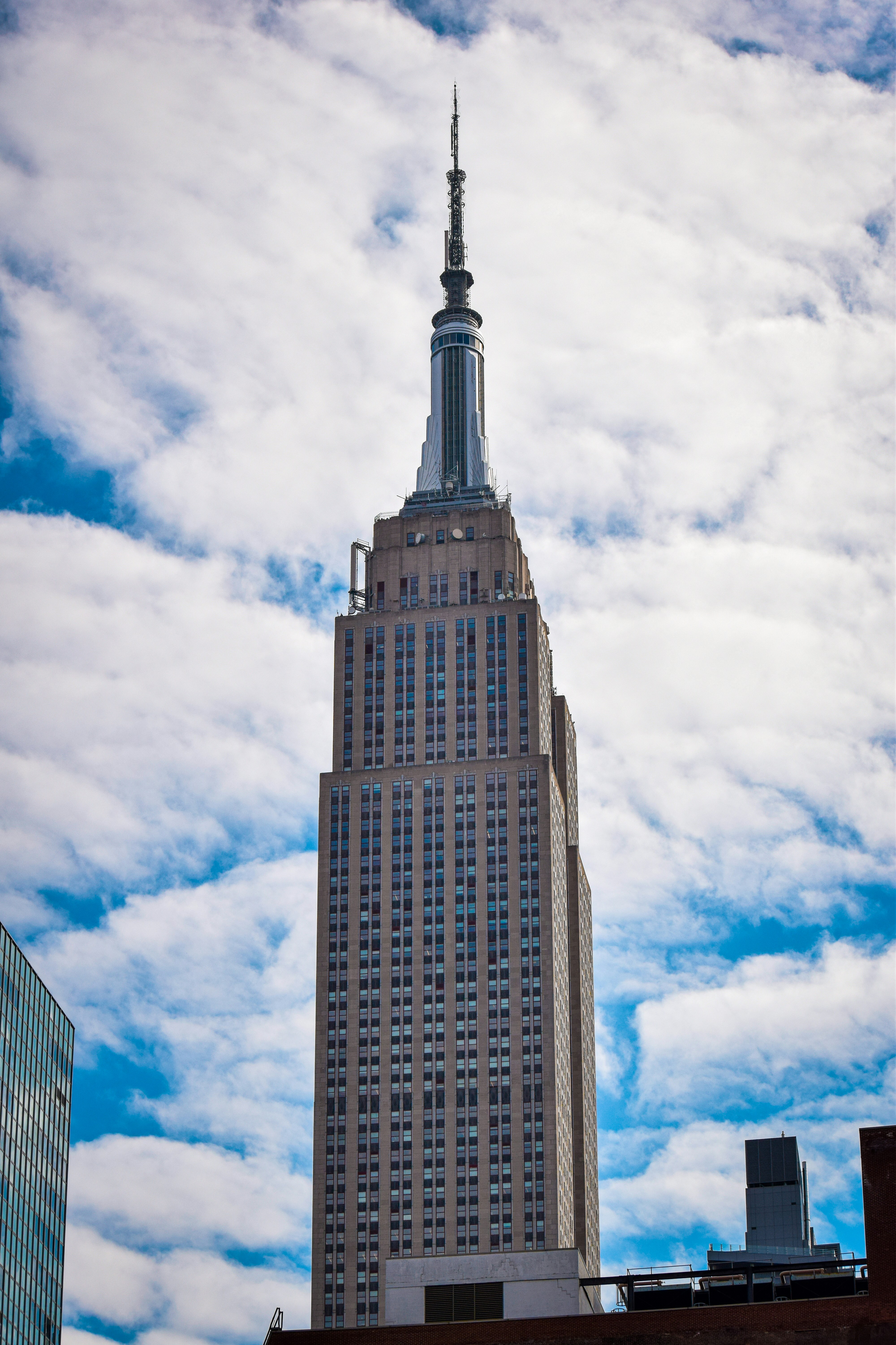 A very tall building with a very tall spire photo – Free New york Image ...