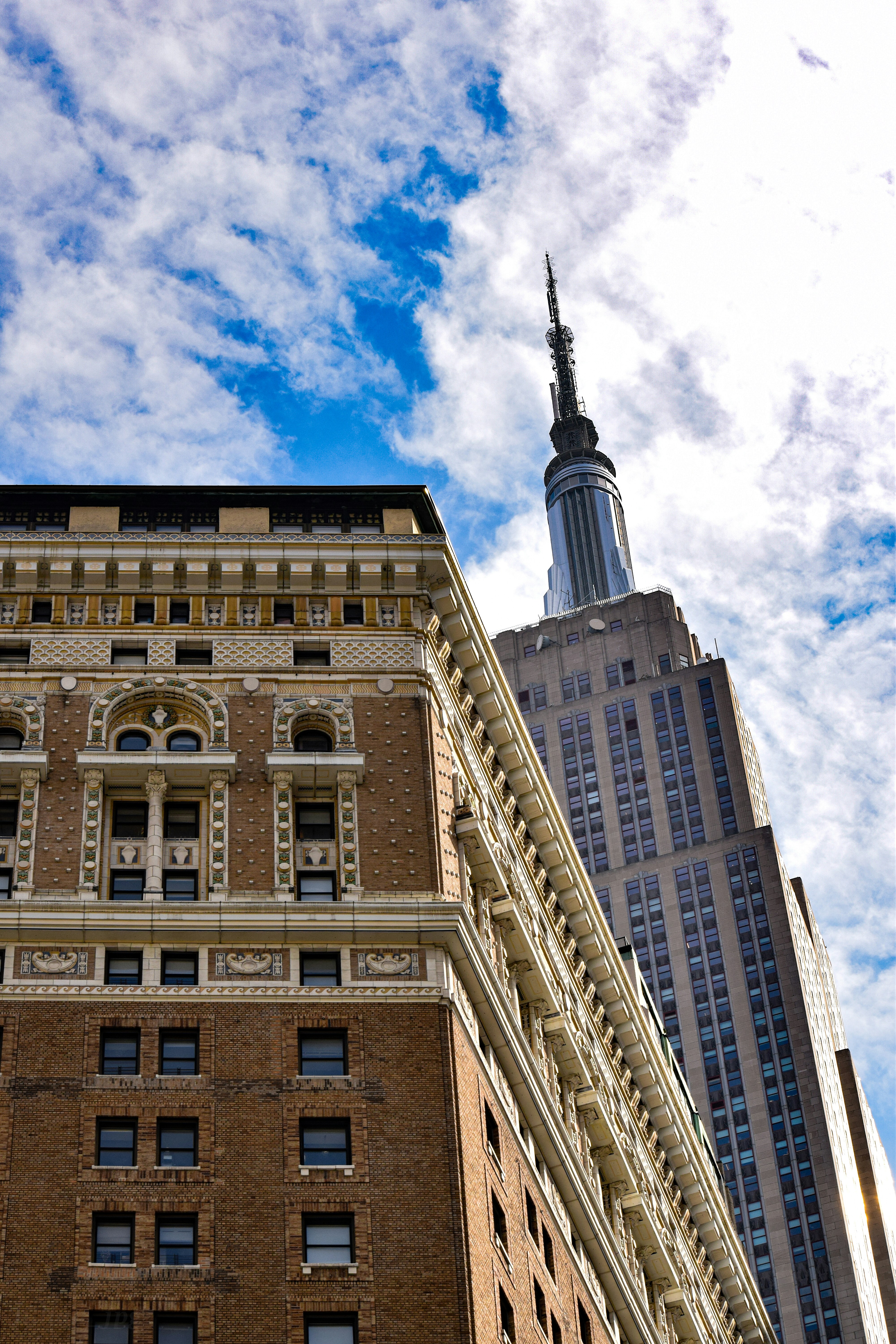 a tall building with a clock on the front of it