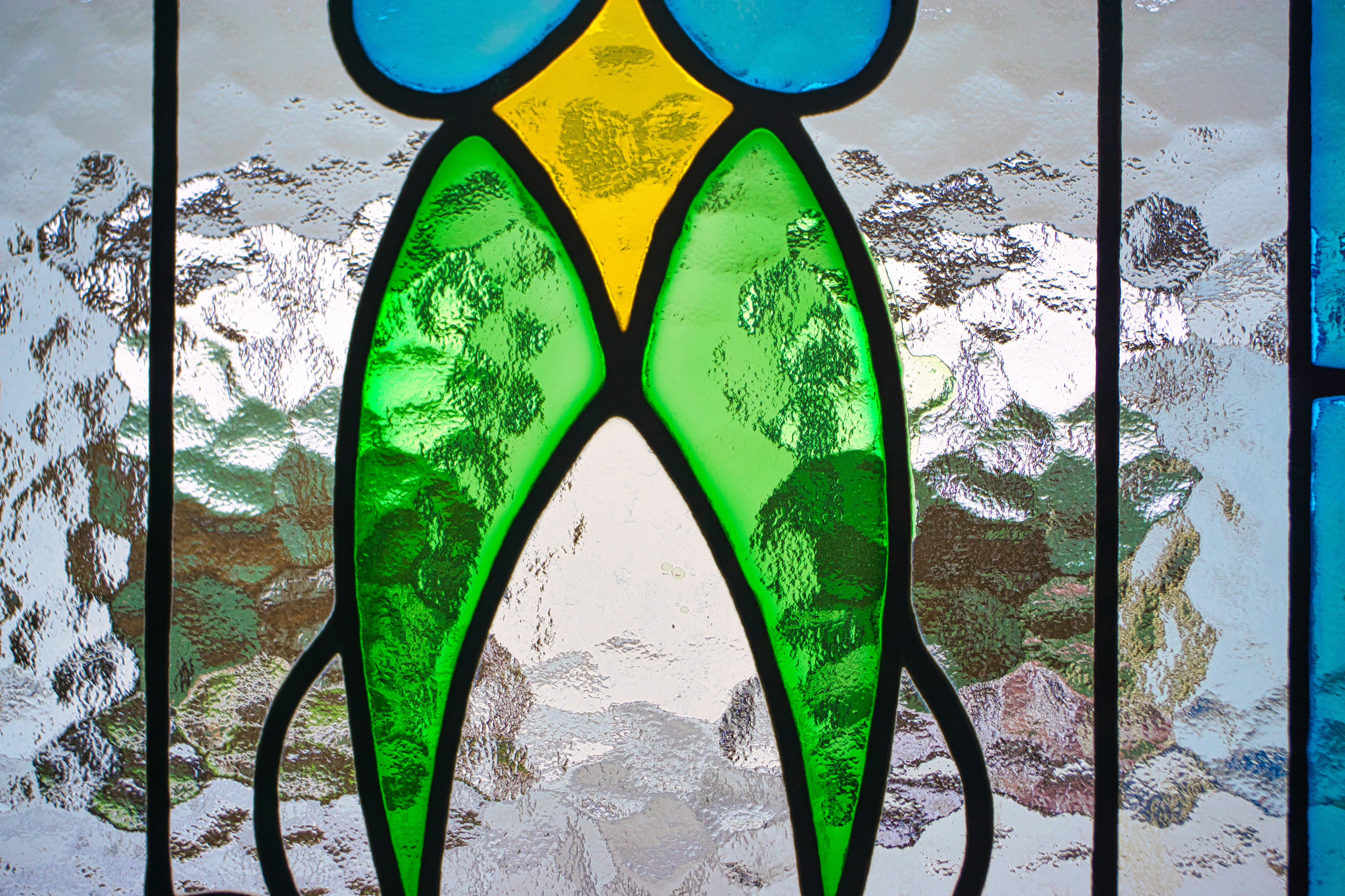 Emerald Petals Converge in Frosted Glass Cathedral