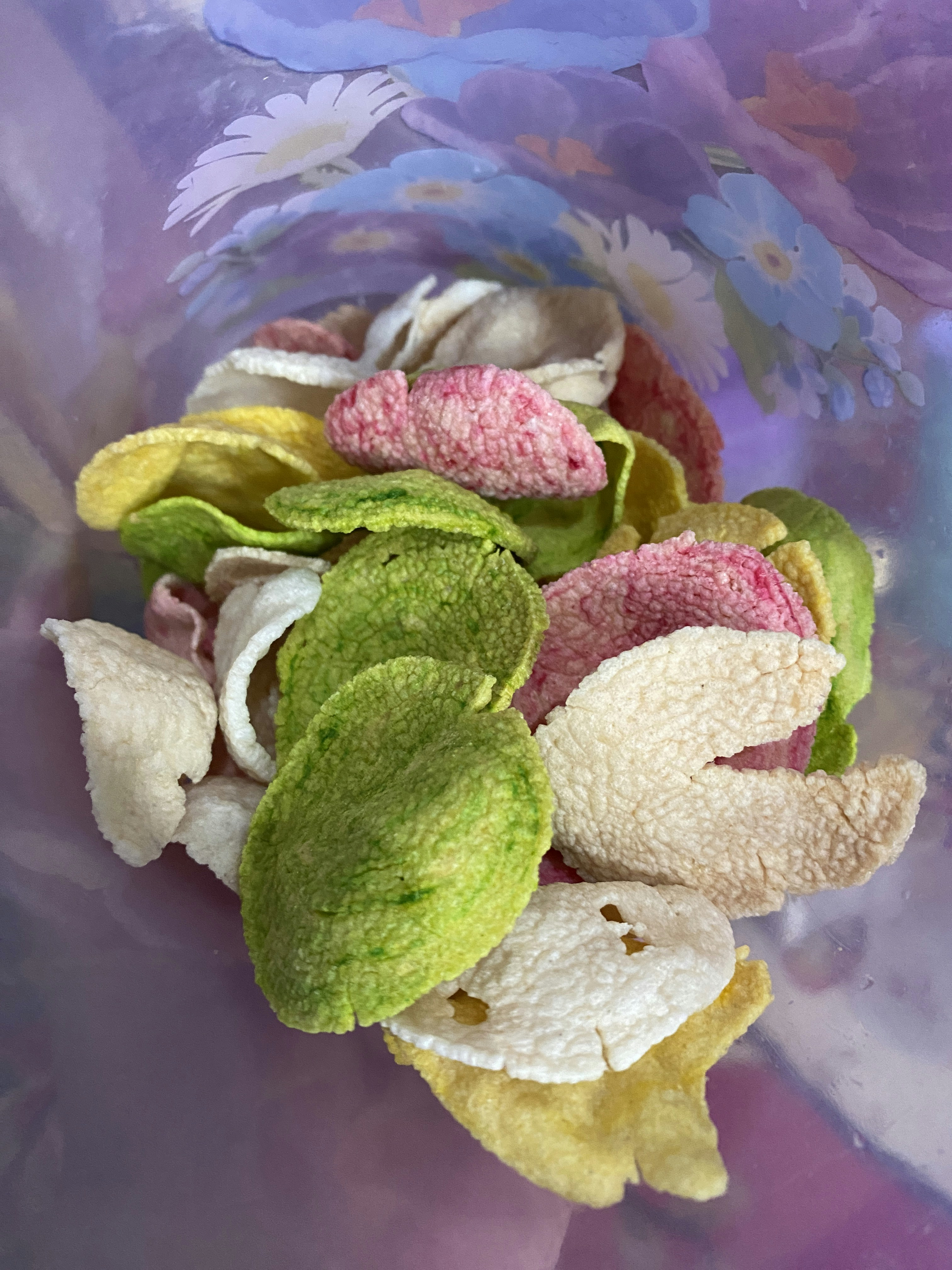 Colorful Dried Fruit Chips Nestled in a Lavender Floral Bag