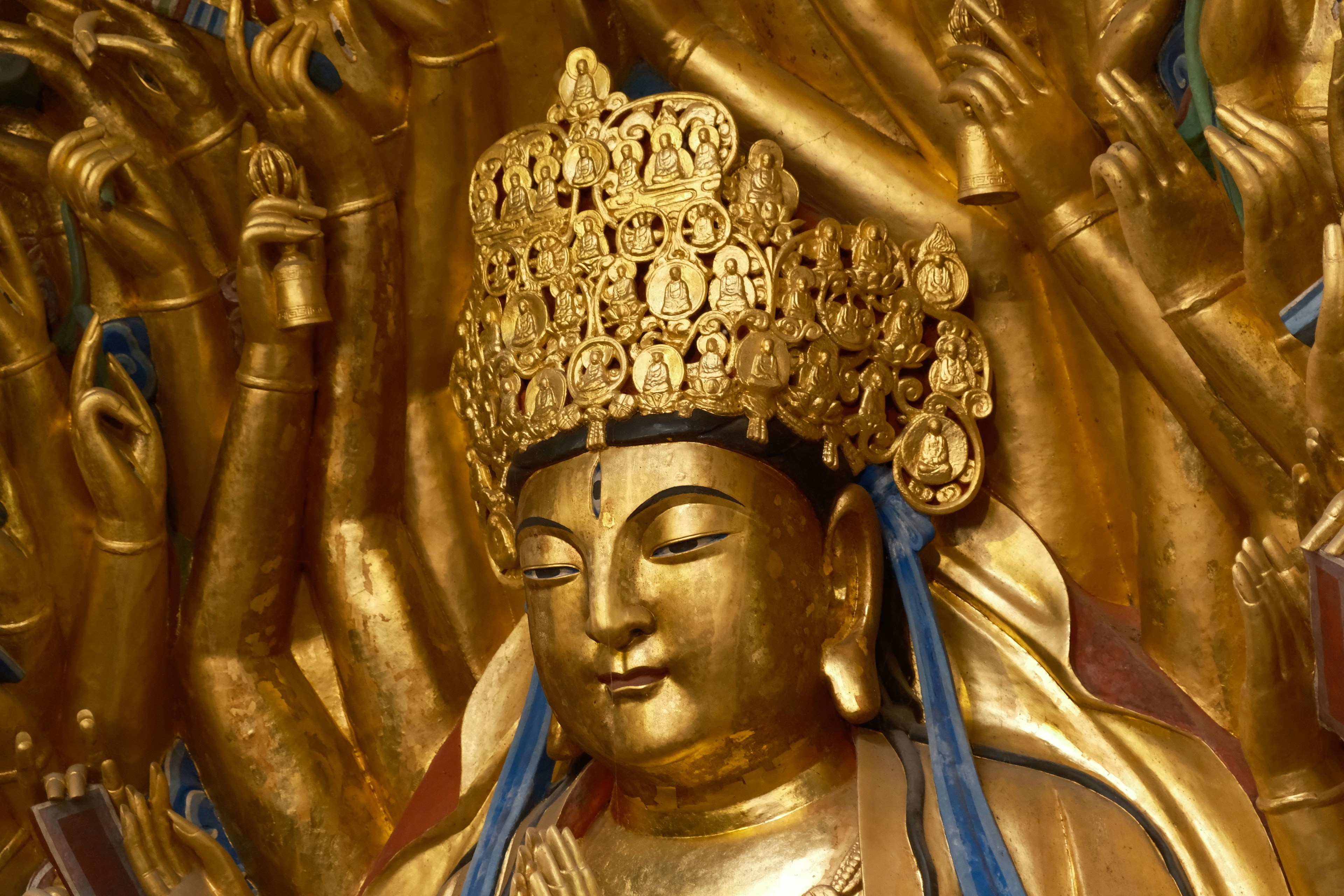 A golden statue of a person with a crown on photo – Free Gold Image on ...