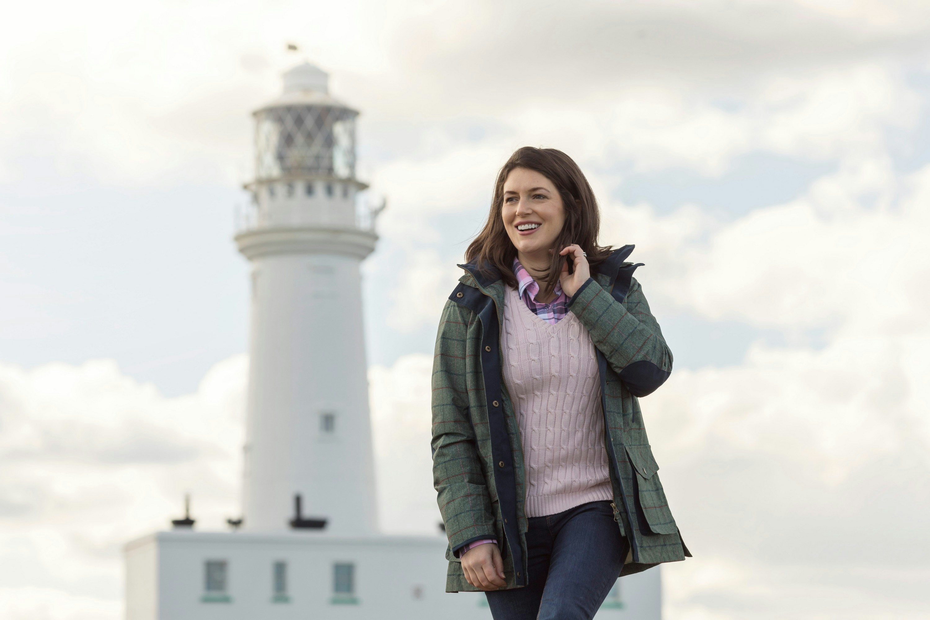 Lighthouse Moments: A Portrait Against the Coastal Light