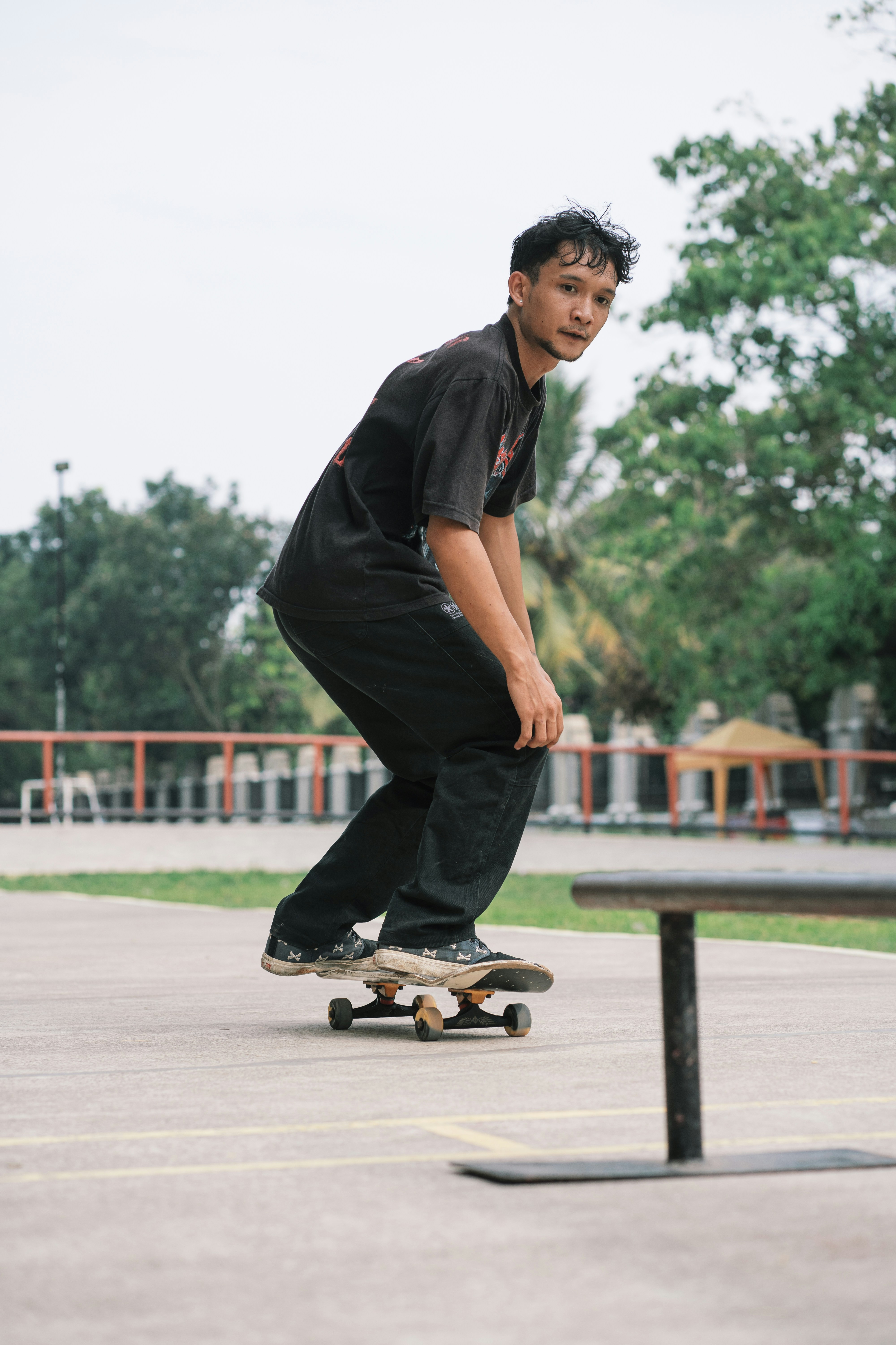 Skateboarder in Motion: A Park Session