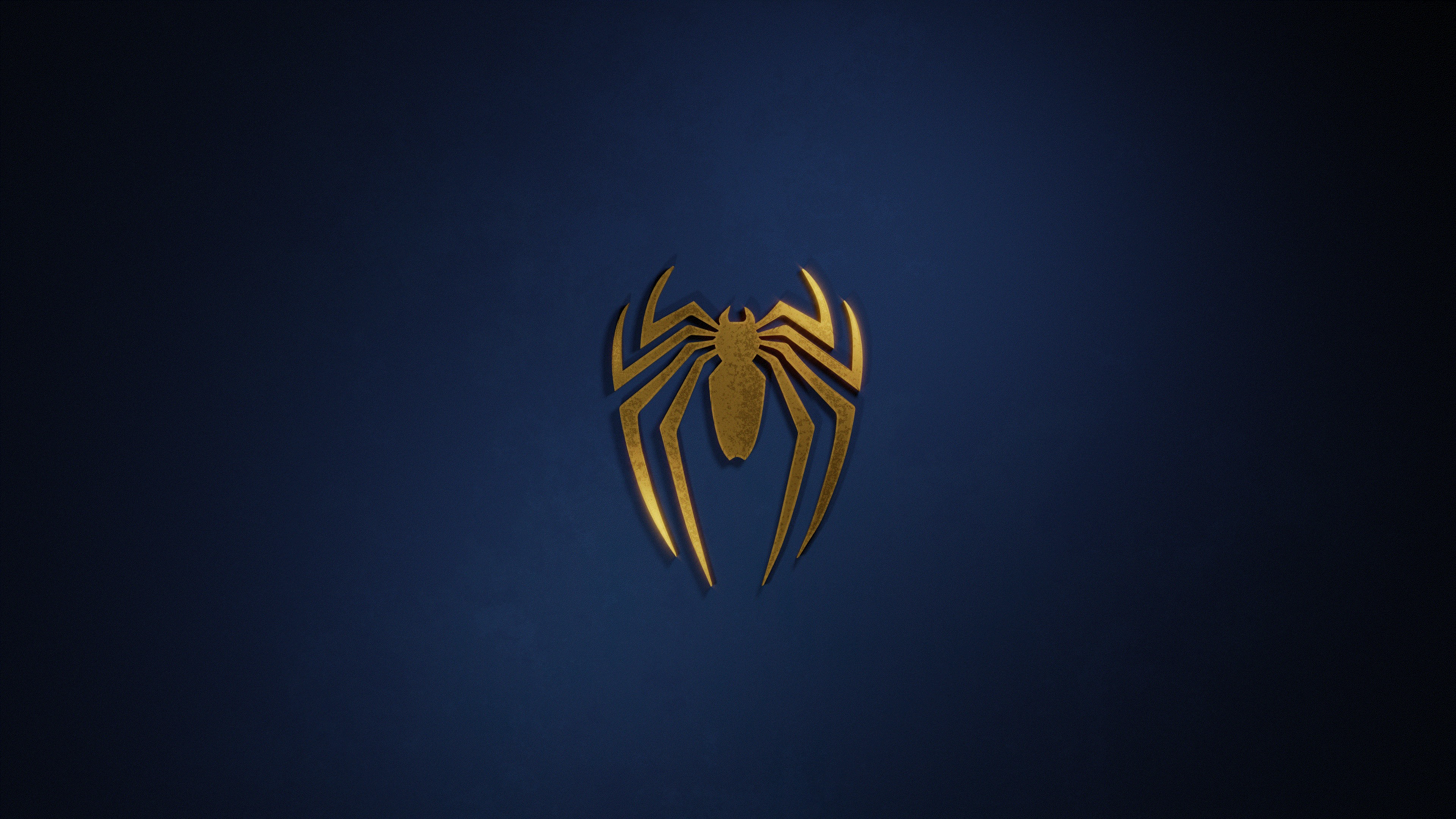 A golden spider logo on a dark blue background photo – Free Spider ...