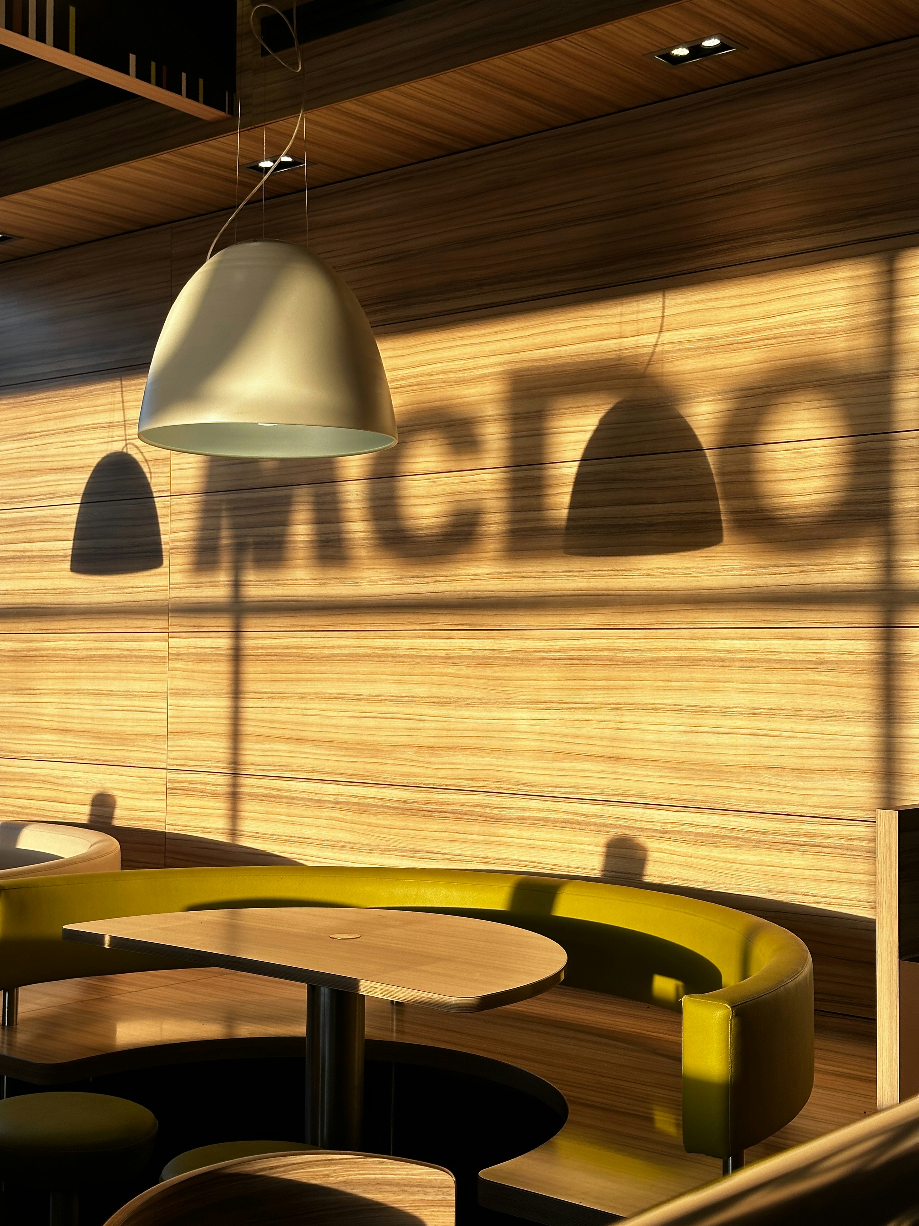 Sunlit Cafe Nook with Shadowed McCafe Letters