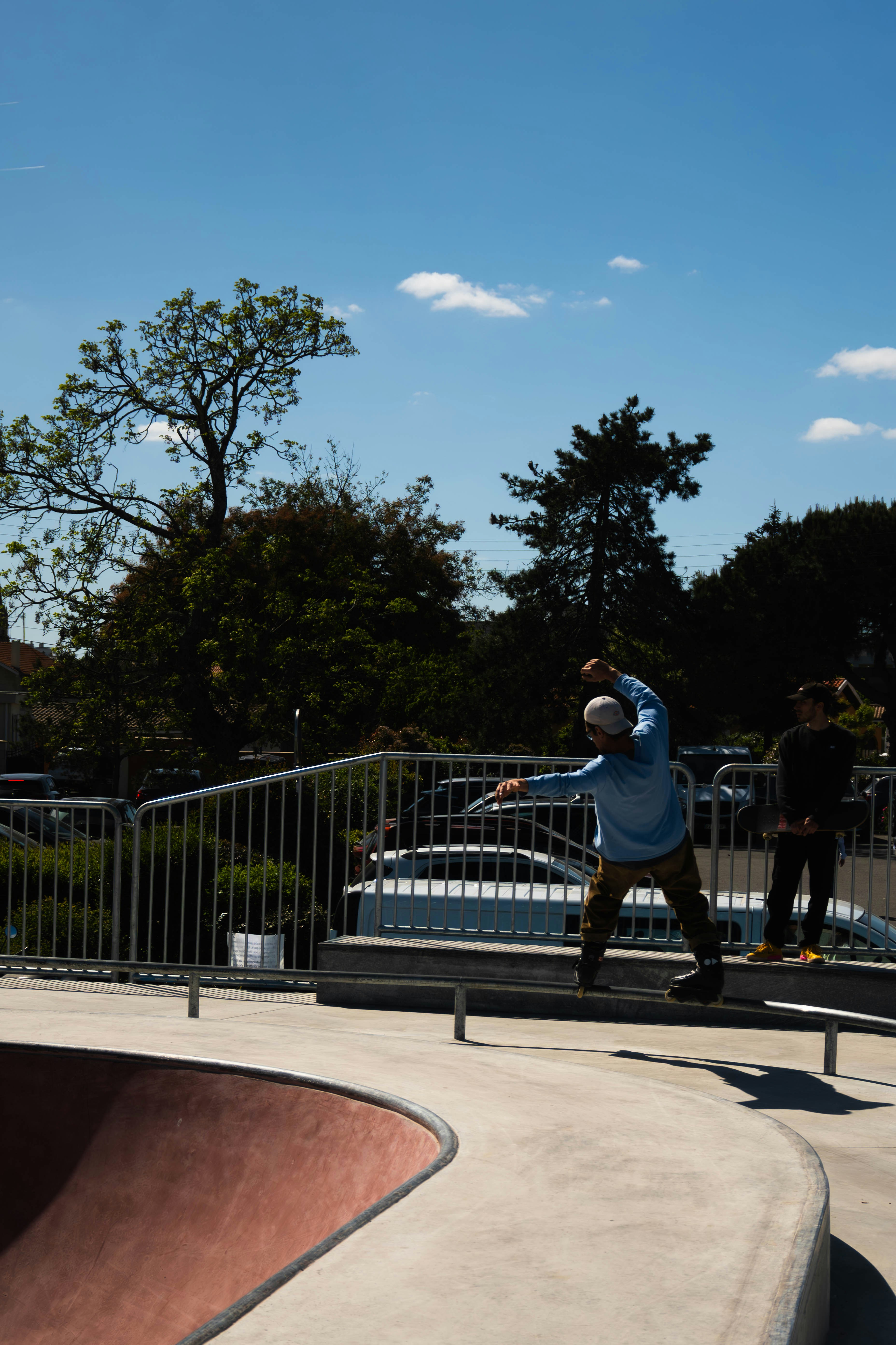 A man riding a skateboard up the side of a ramp photo – Free Shoe Image ...