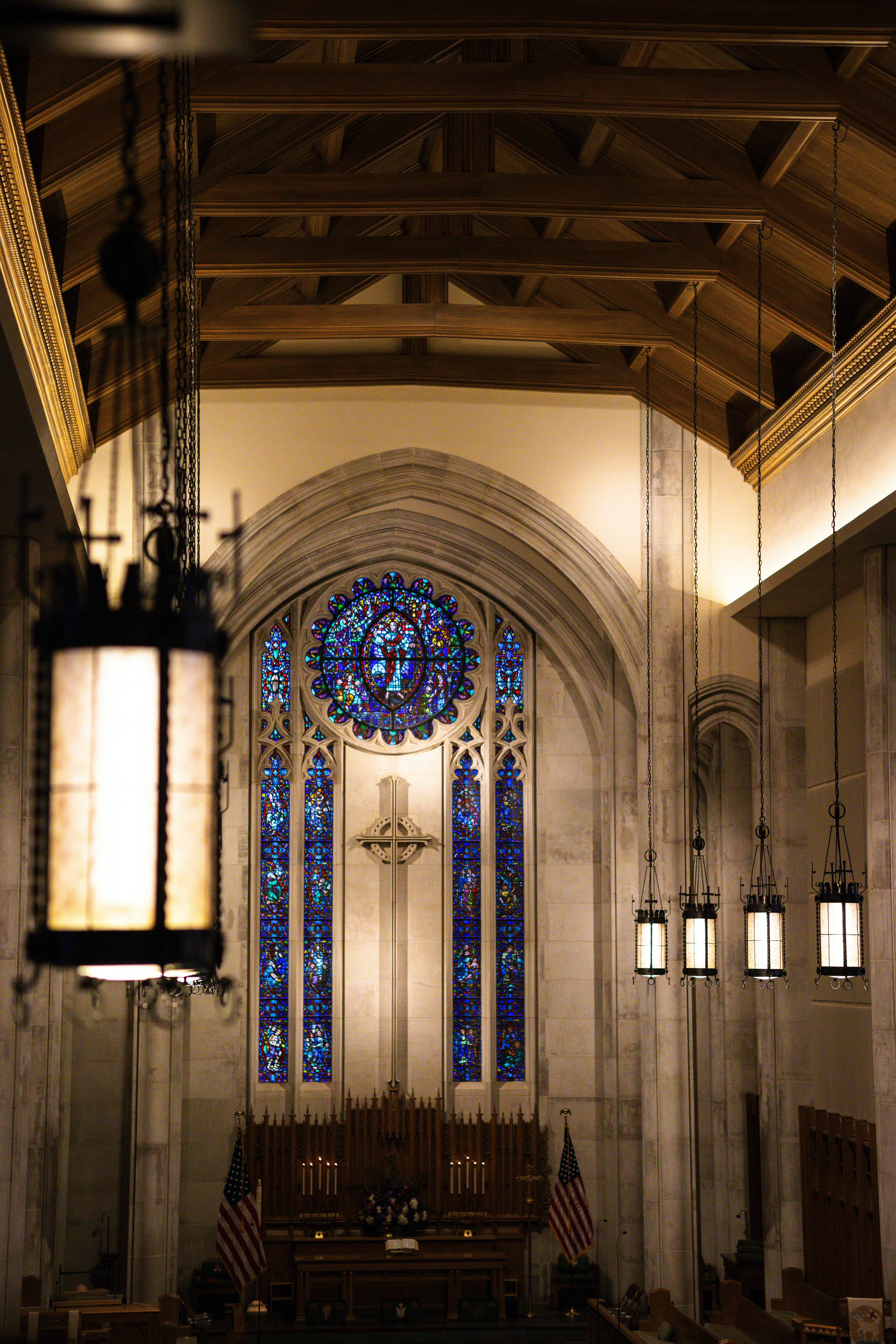 Blue Rose Window Over the Altar: Lantern-Lit Cathedral