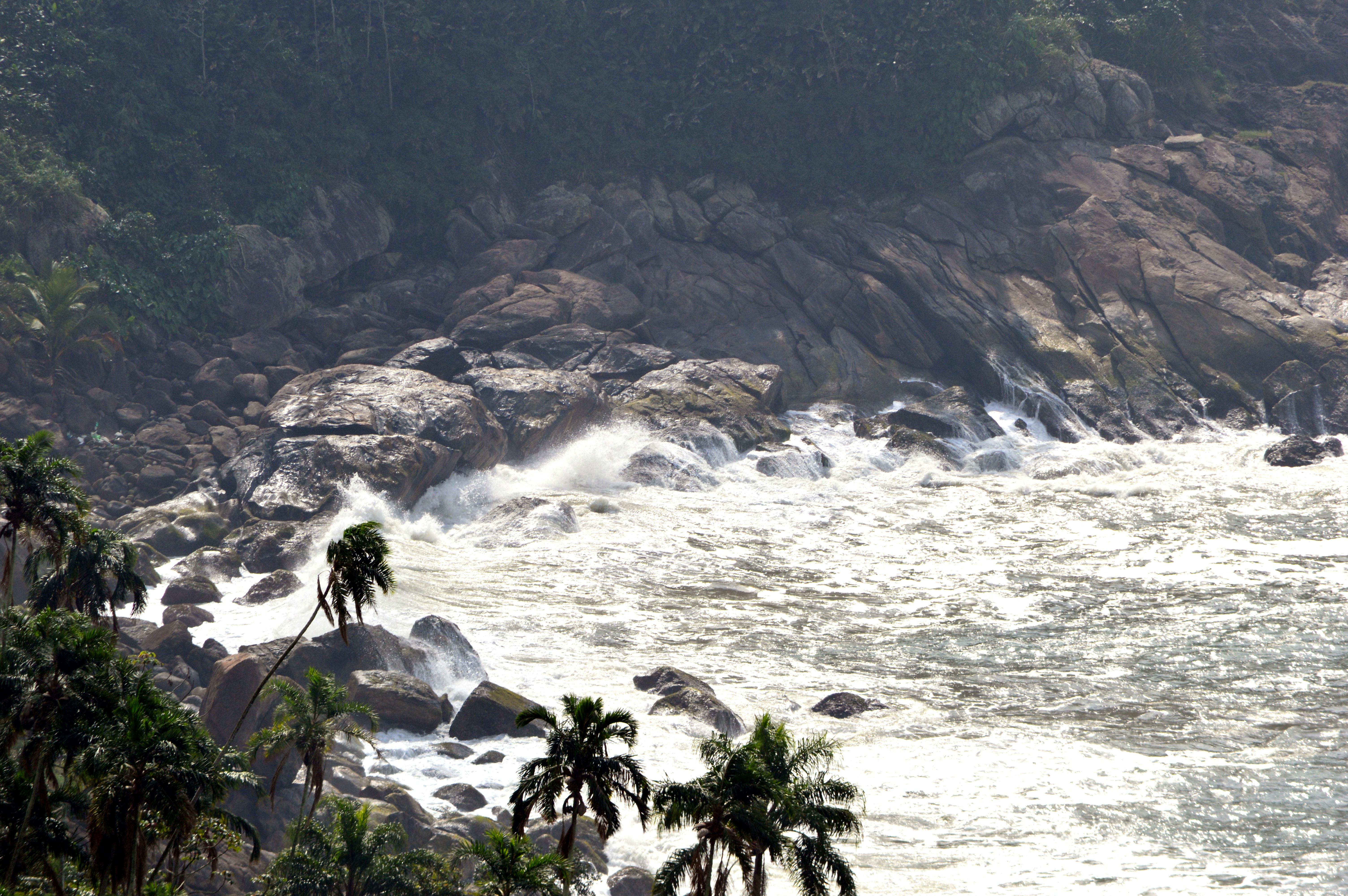 Waves Crashing Against Rocky Shoreline