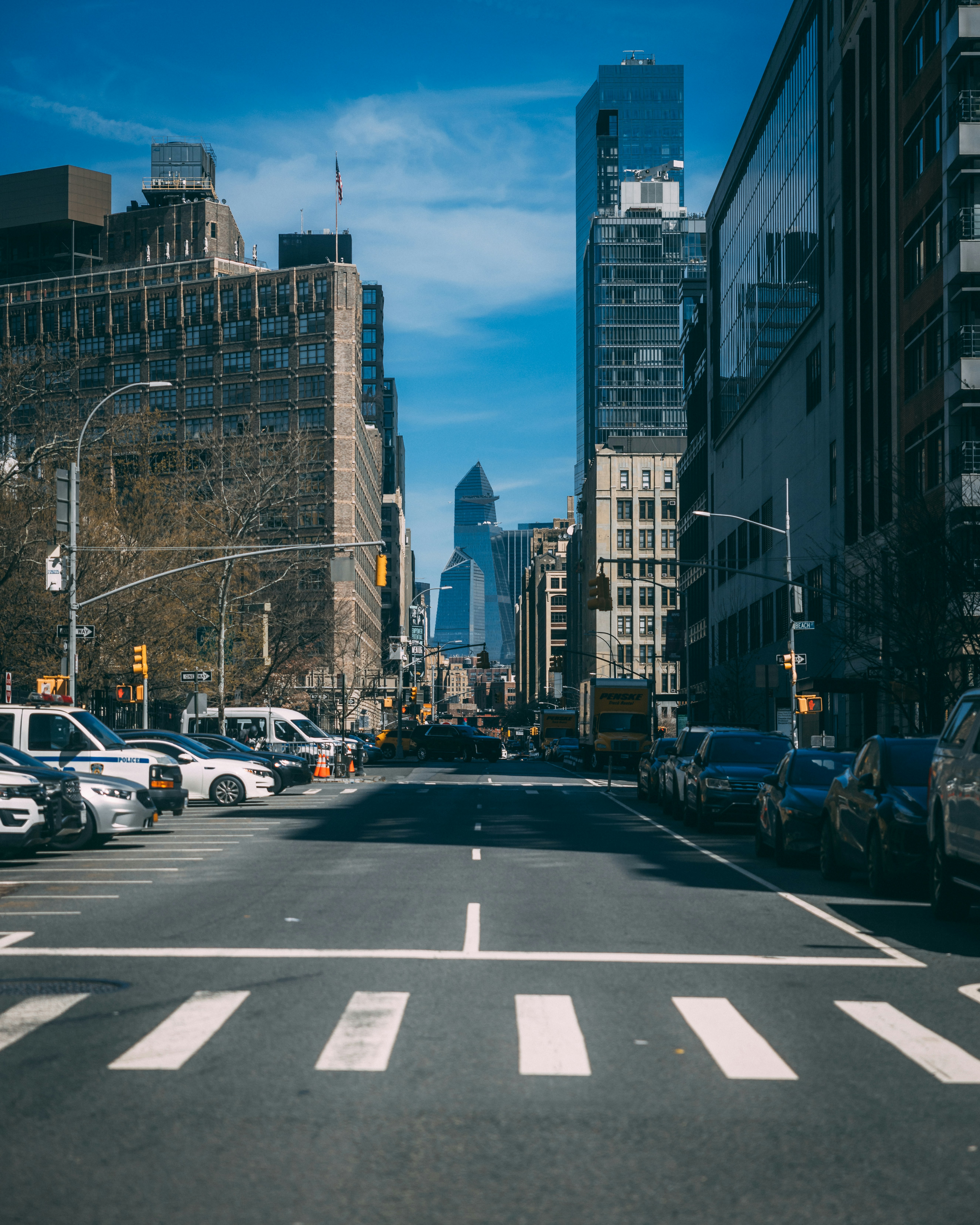 A city street filled with lots of traffic and tall buildings photo ...