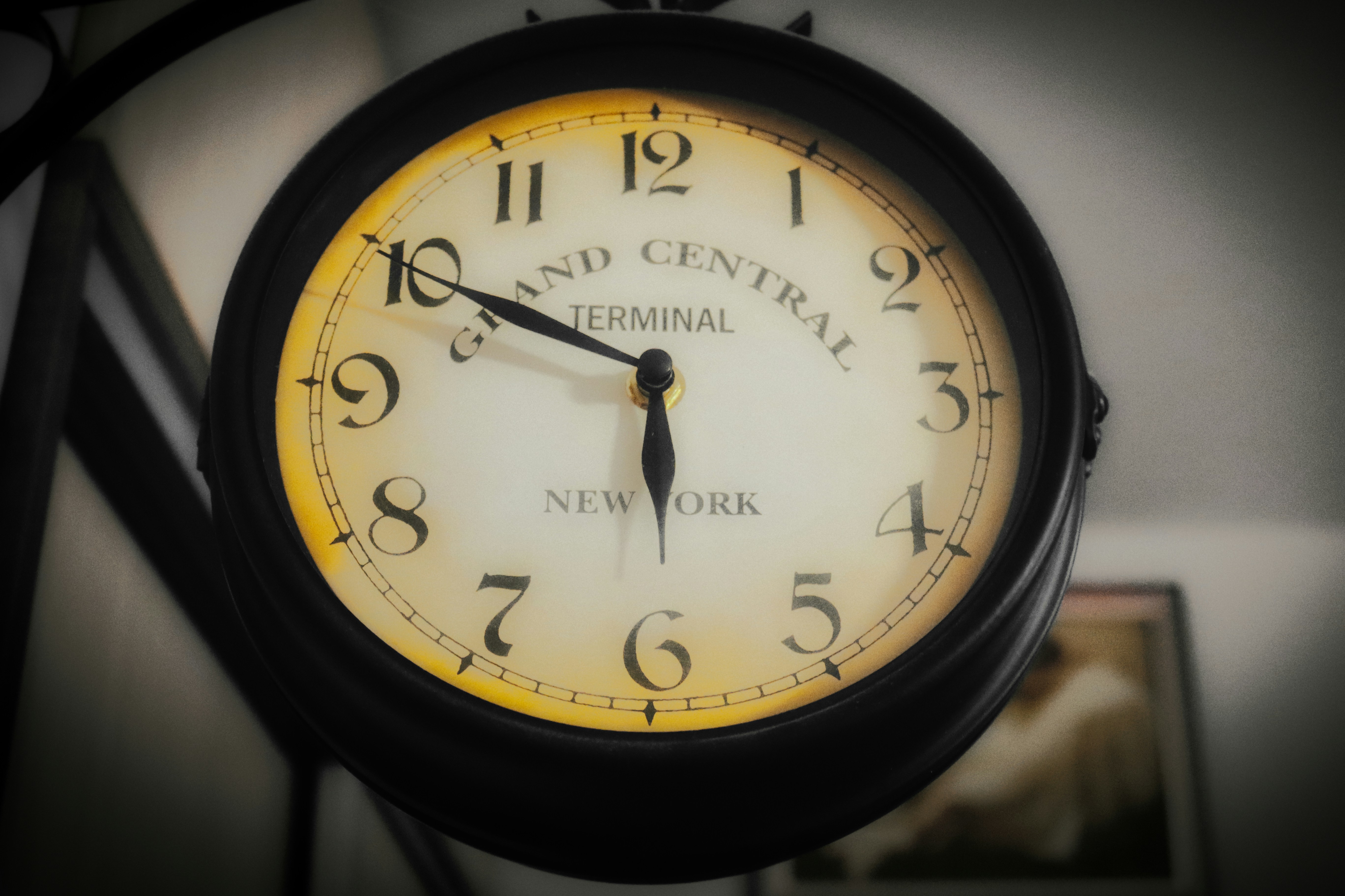 Timekeeper at Grand Central: A Warm-Hued Clock on a Quiet Wall