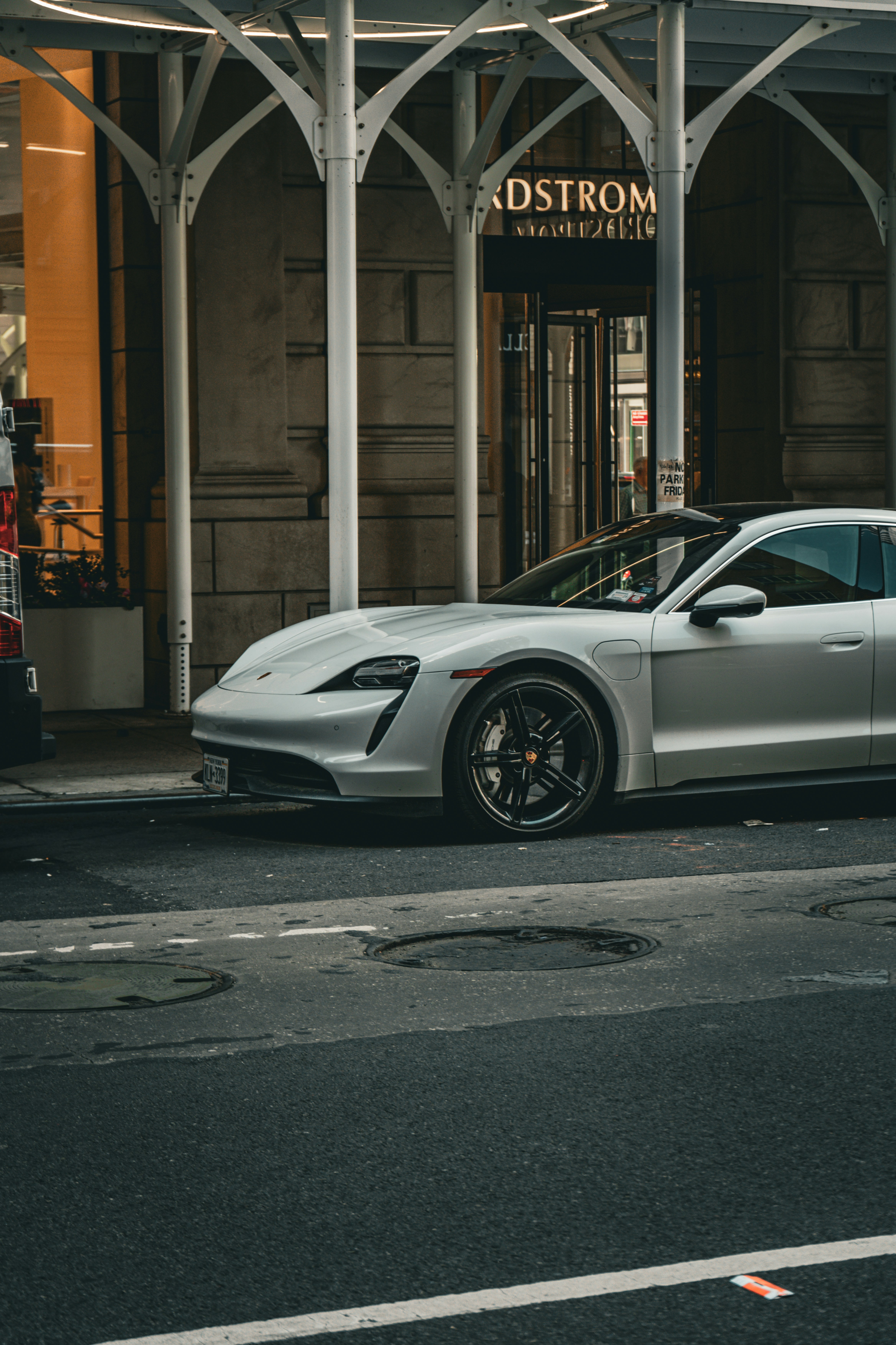 Urban Arcadia: White Porsche Under the City Arches