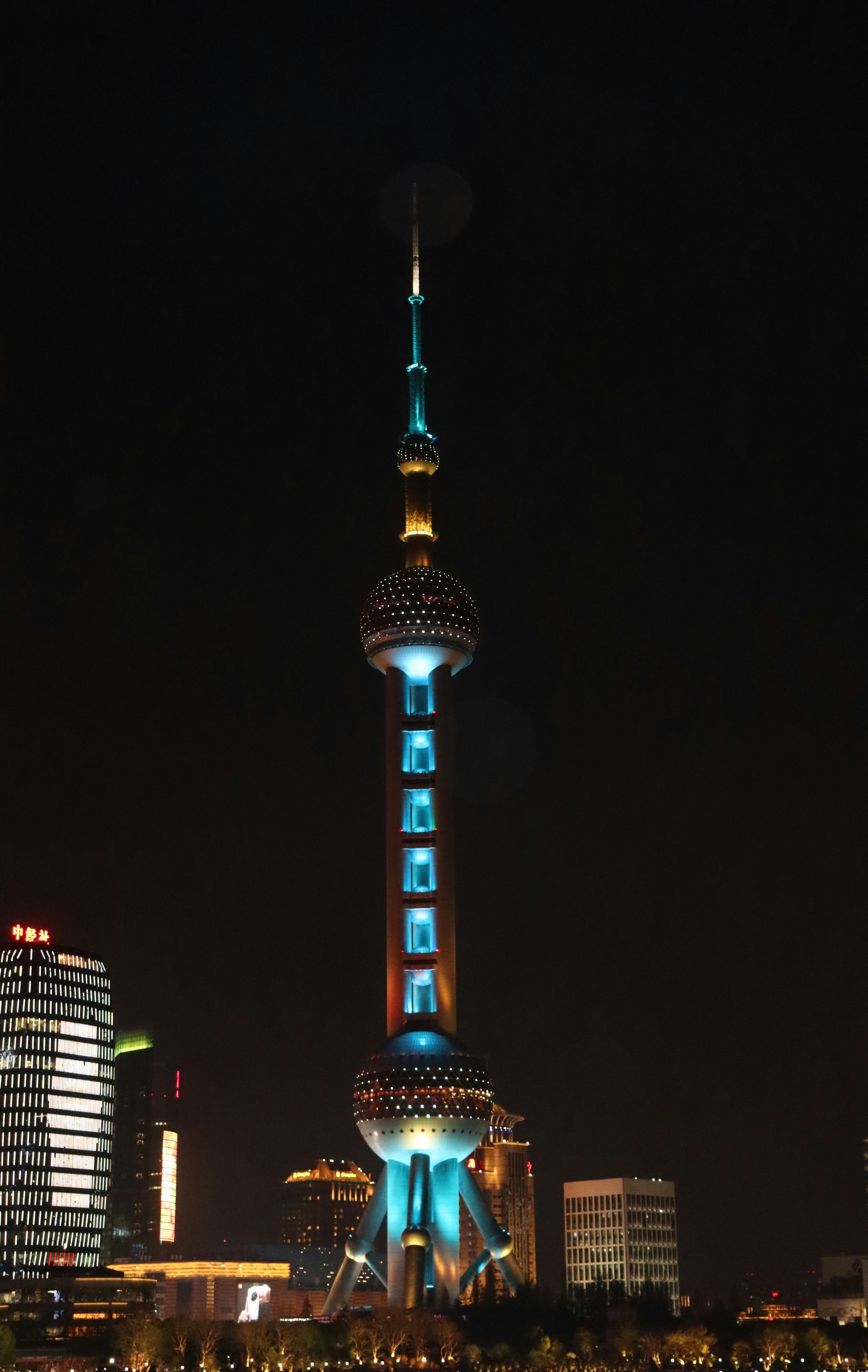 Neon Spire Over Shanghai: The Oriental Pearl Tower in Night Radiance
