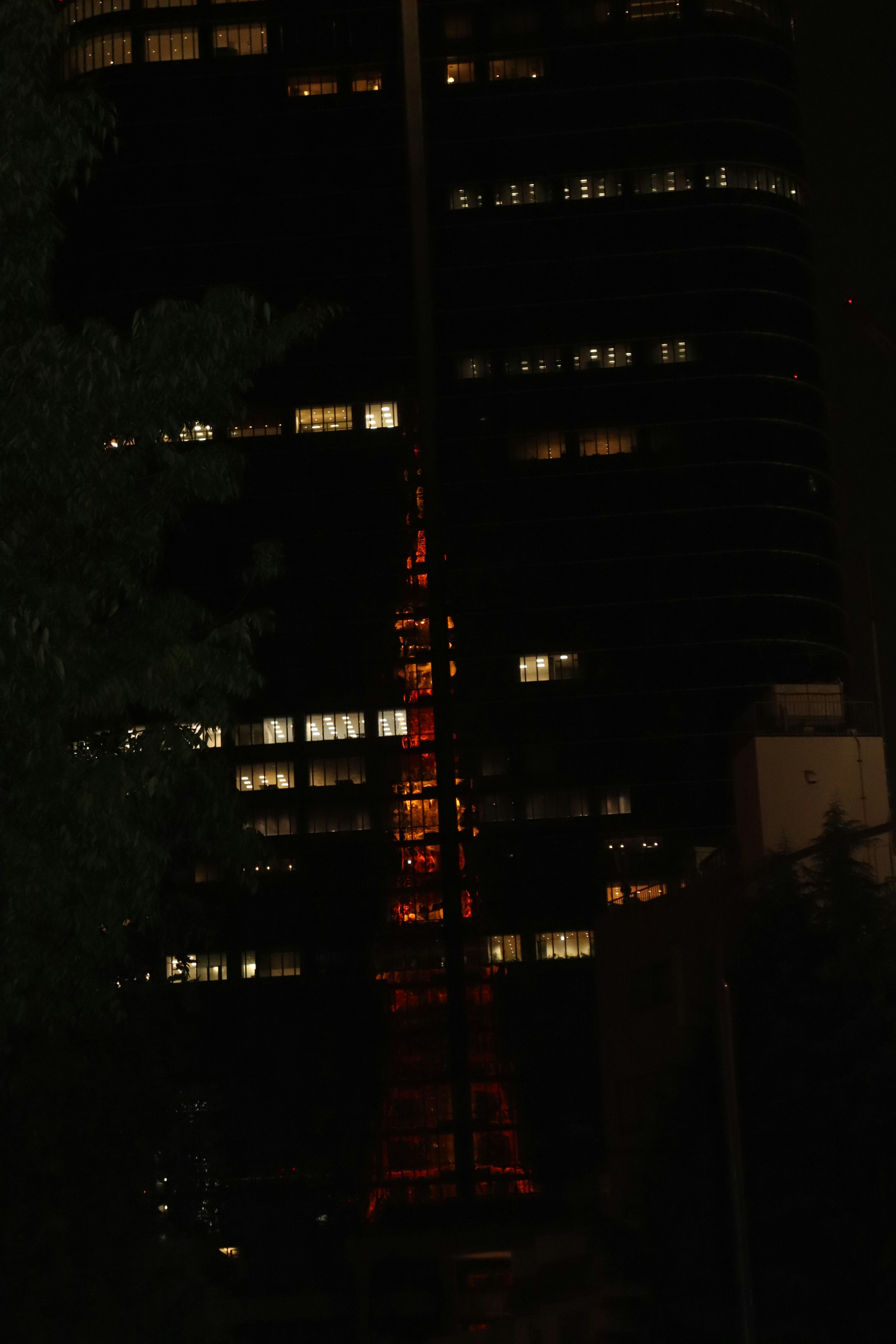 Ember-Tower Pierces a Quiet Night Skyline