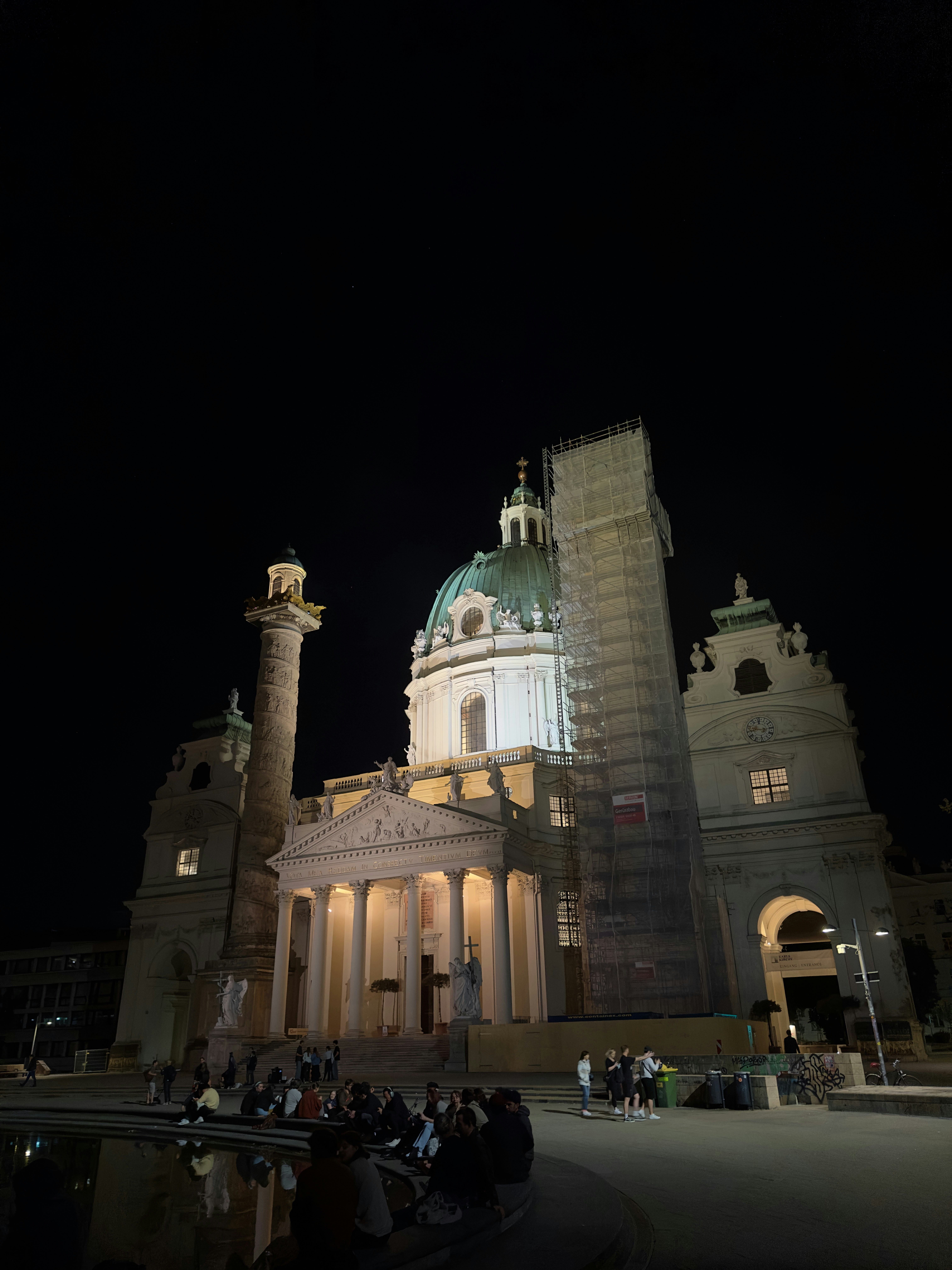 Gilded Dome at Night: Quiet Piazza in Front of a Scaffolded Cathedral