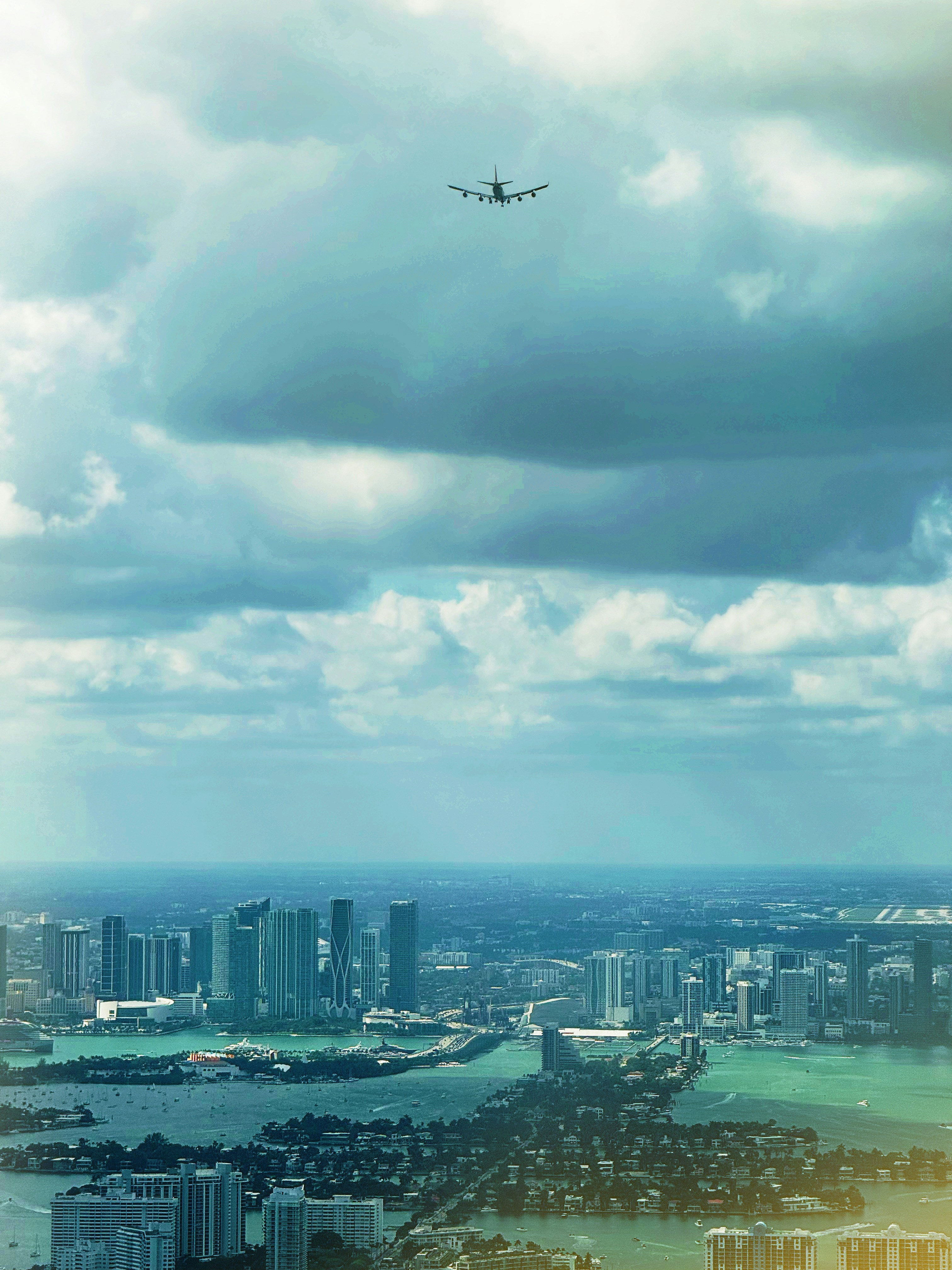 Airborne Center: A Cityscape Under a Dawn-Washed Sky