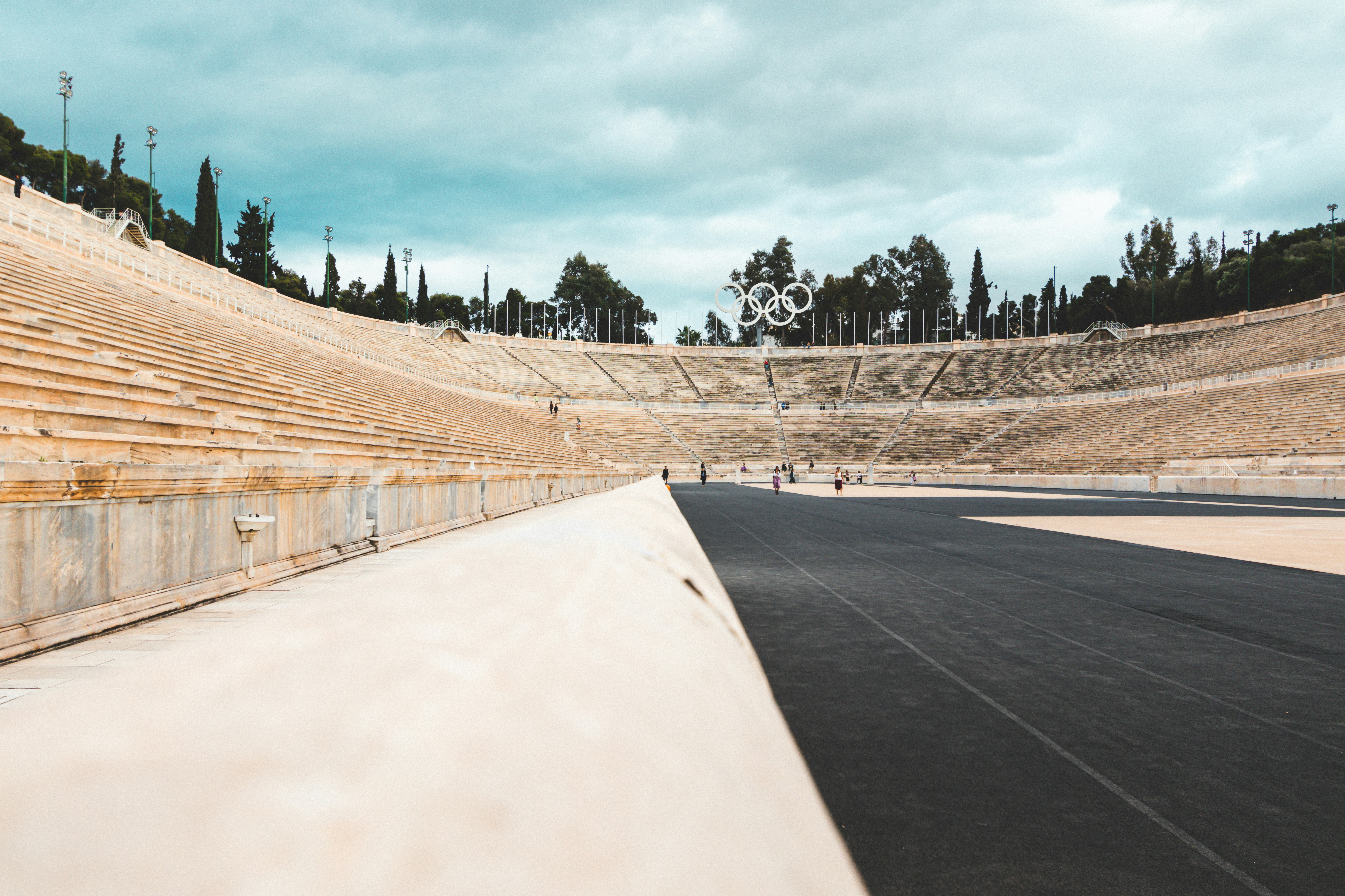 Rings Above the Quiet Bowl: A Vanishing Point Across an Empty Stadium