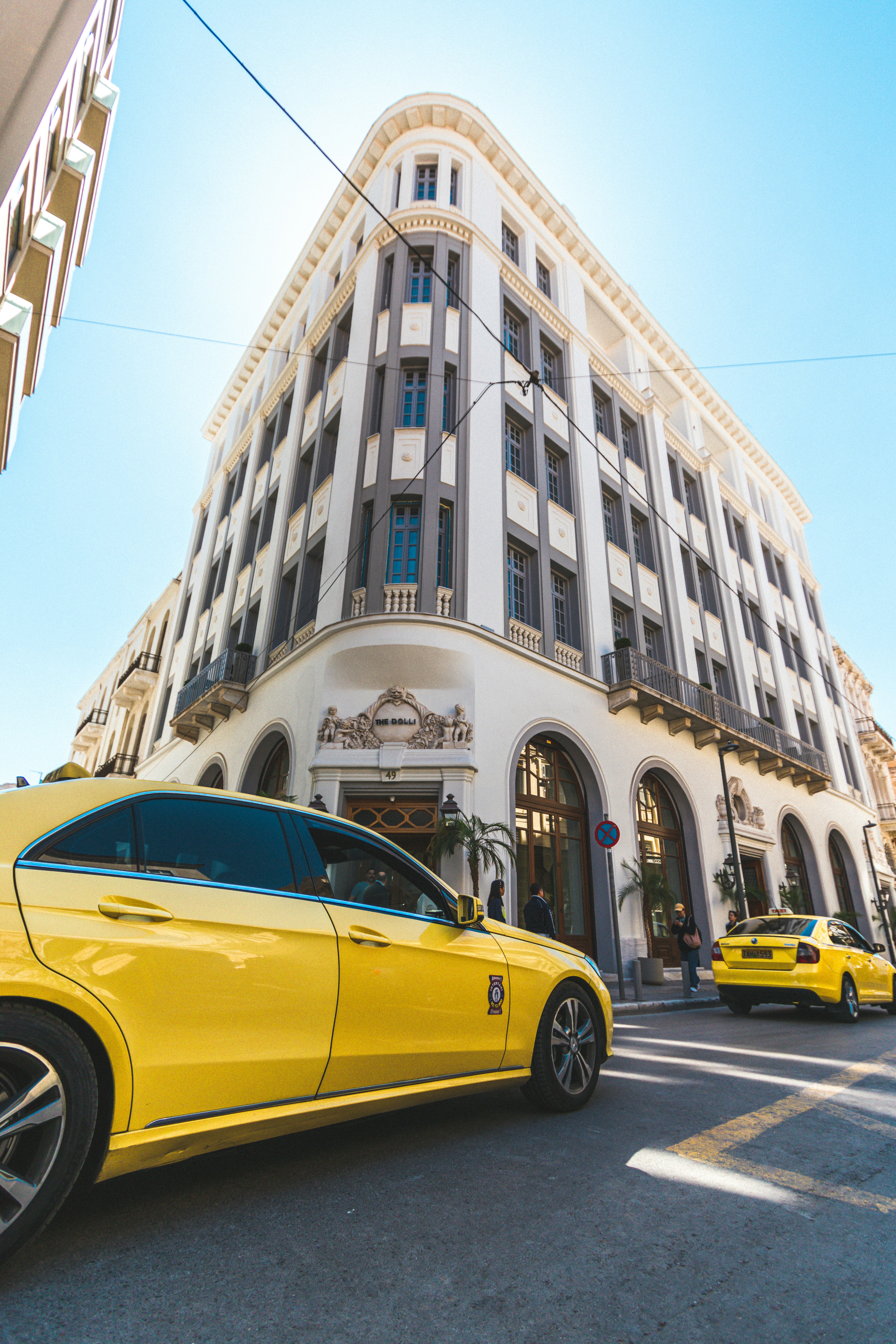 Golden Street, Blue Sky, and a Grand Facade
