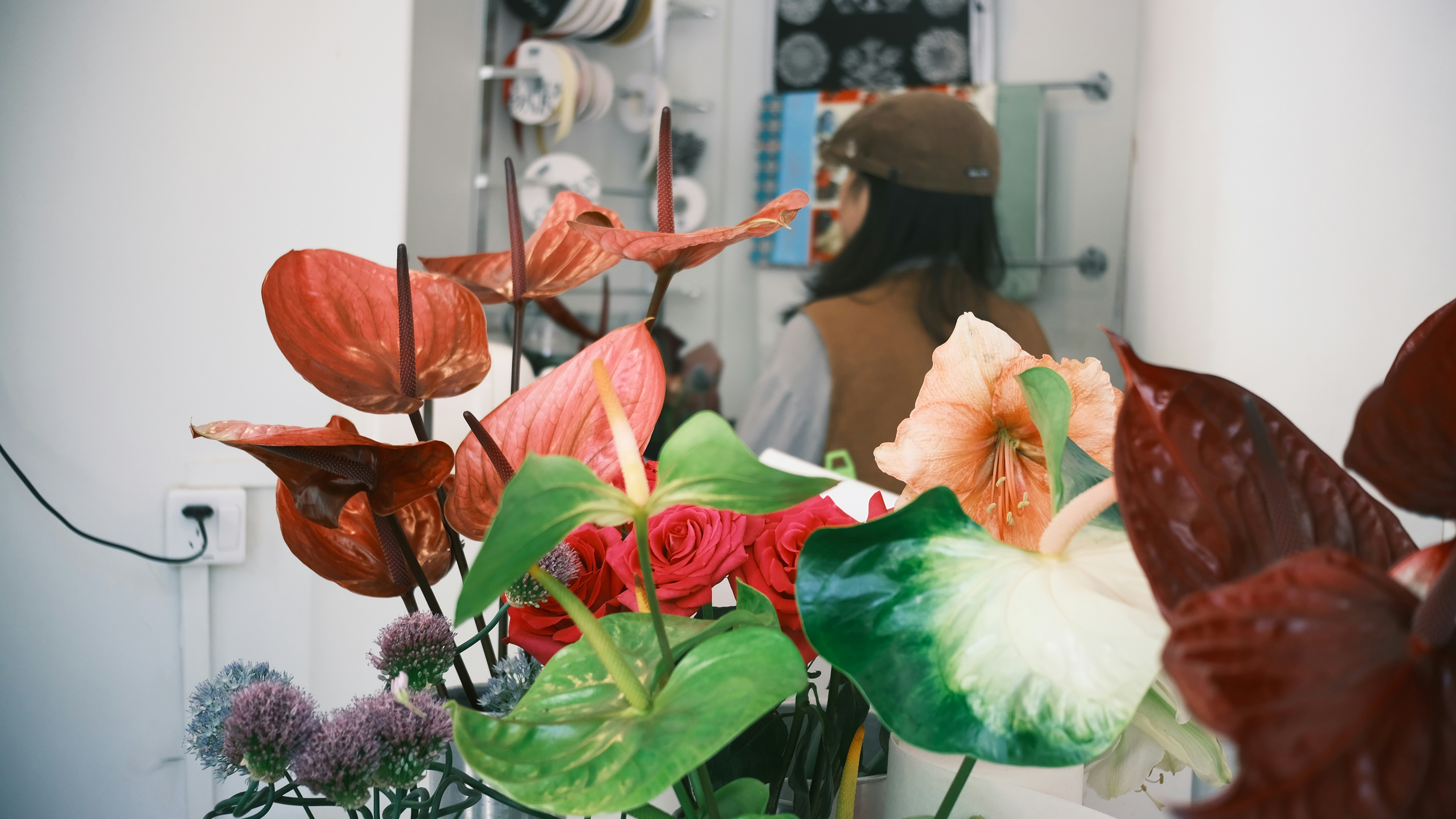Front-row of Florals with a Back-turned Observer